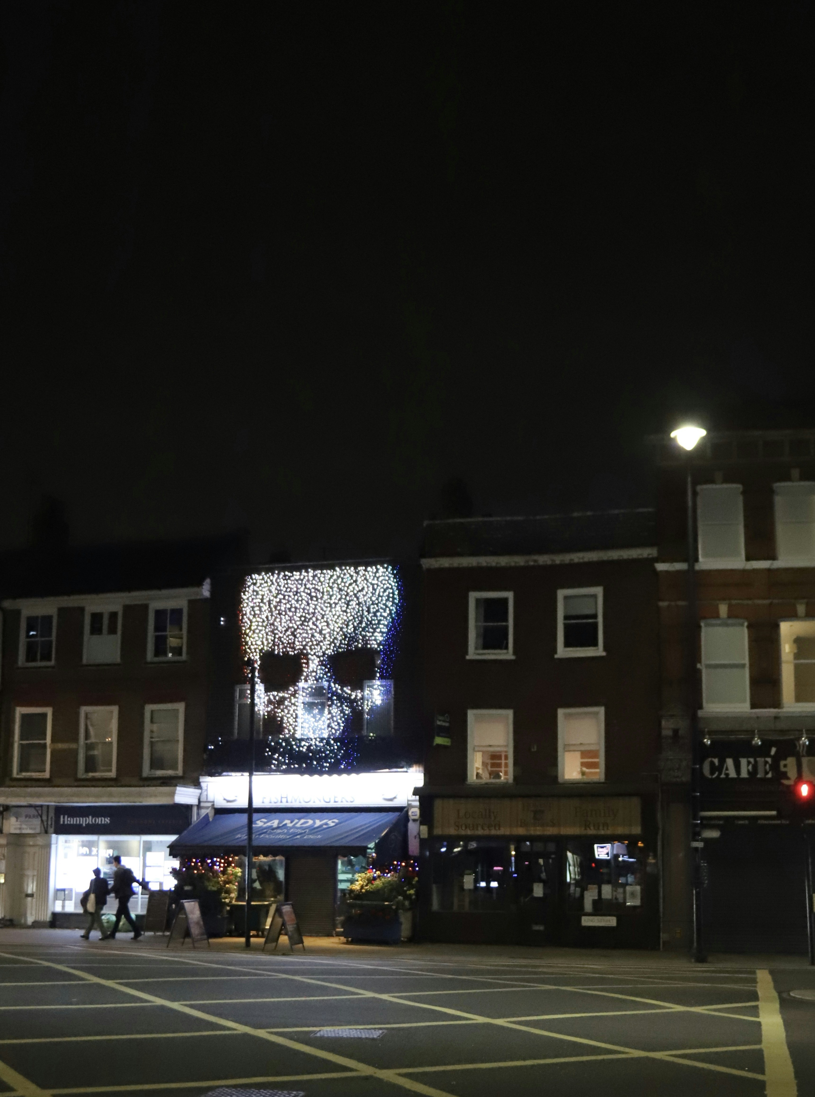 Illuminated Skulls: A Nighttime Urban Spectacle