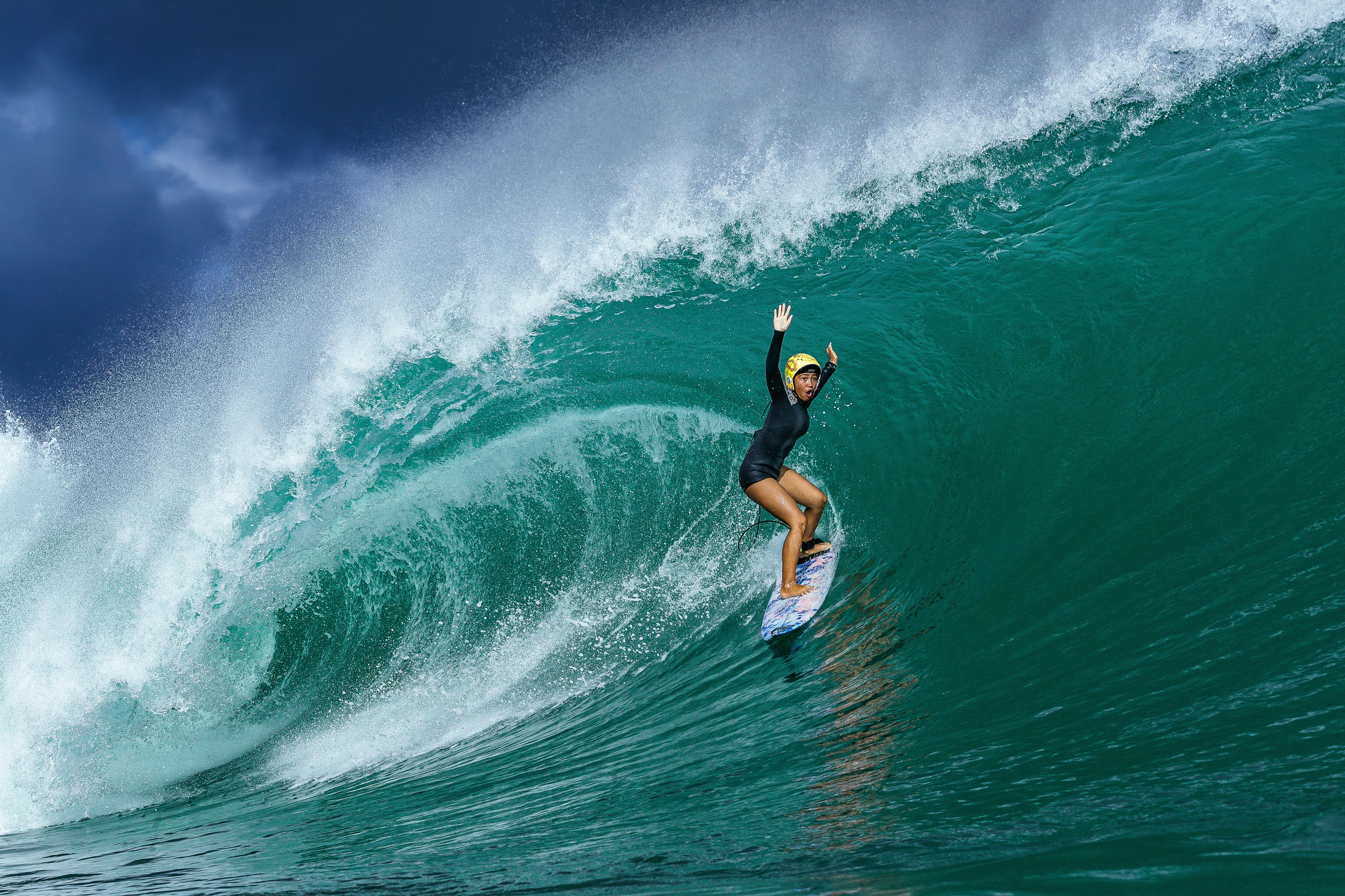 Jasmine Studer Hands in the air at Padang Padang 2022