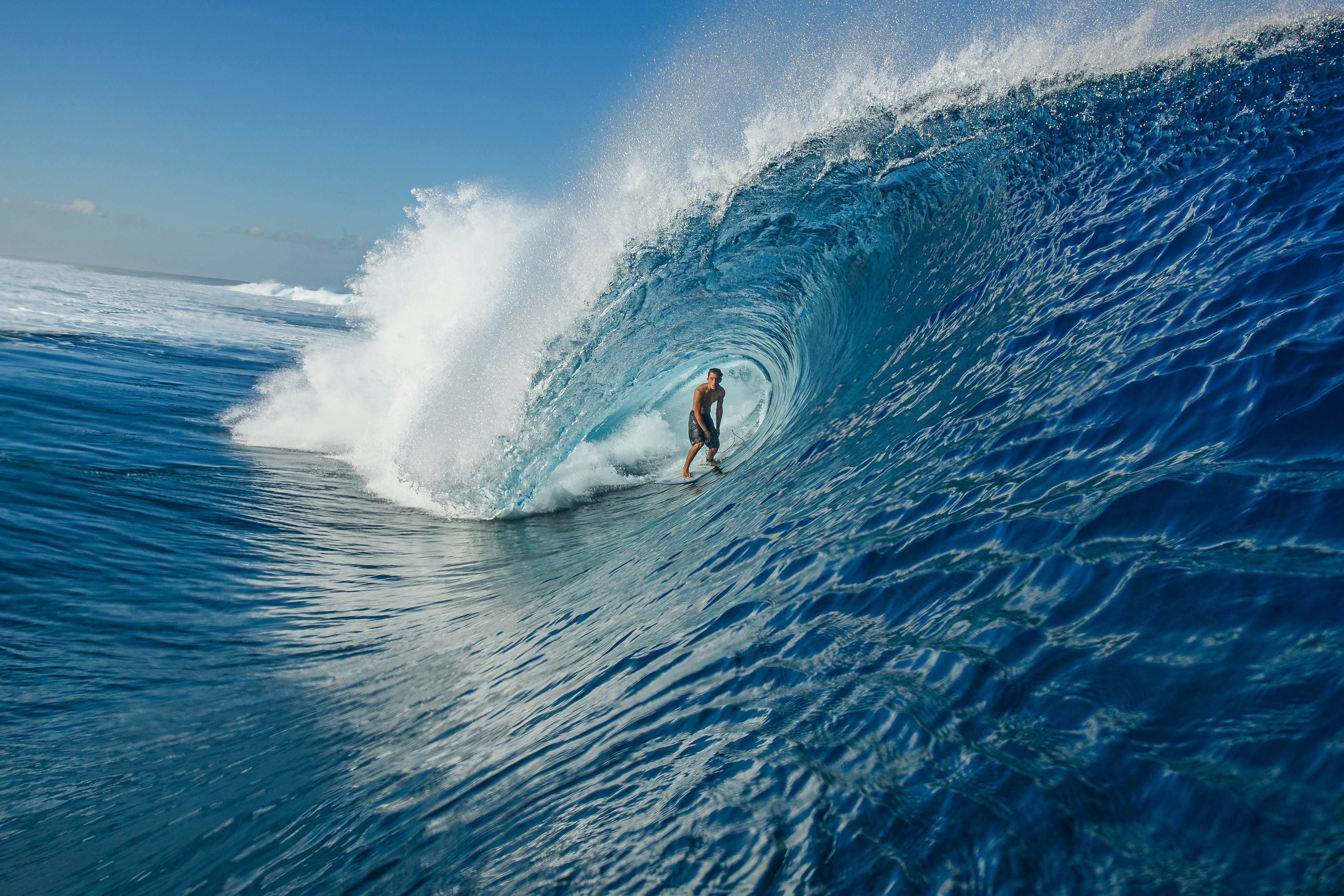 Surfer riding a massive blue ocean wave photo – Free Travel Image on ...