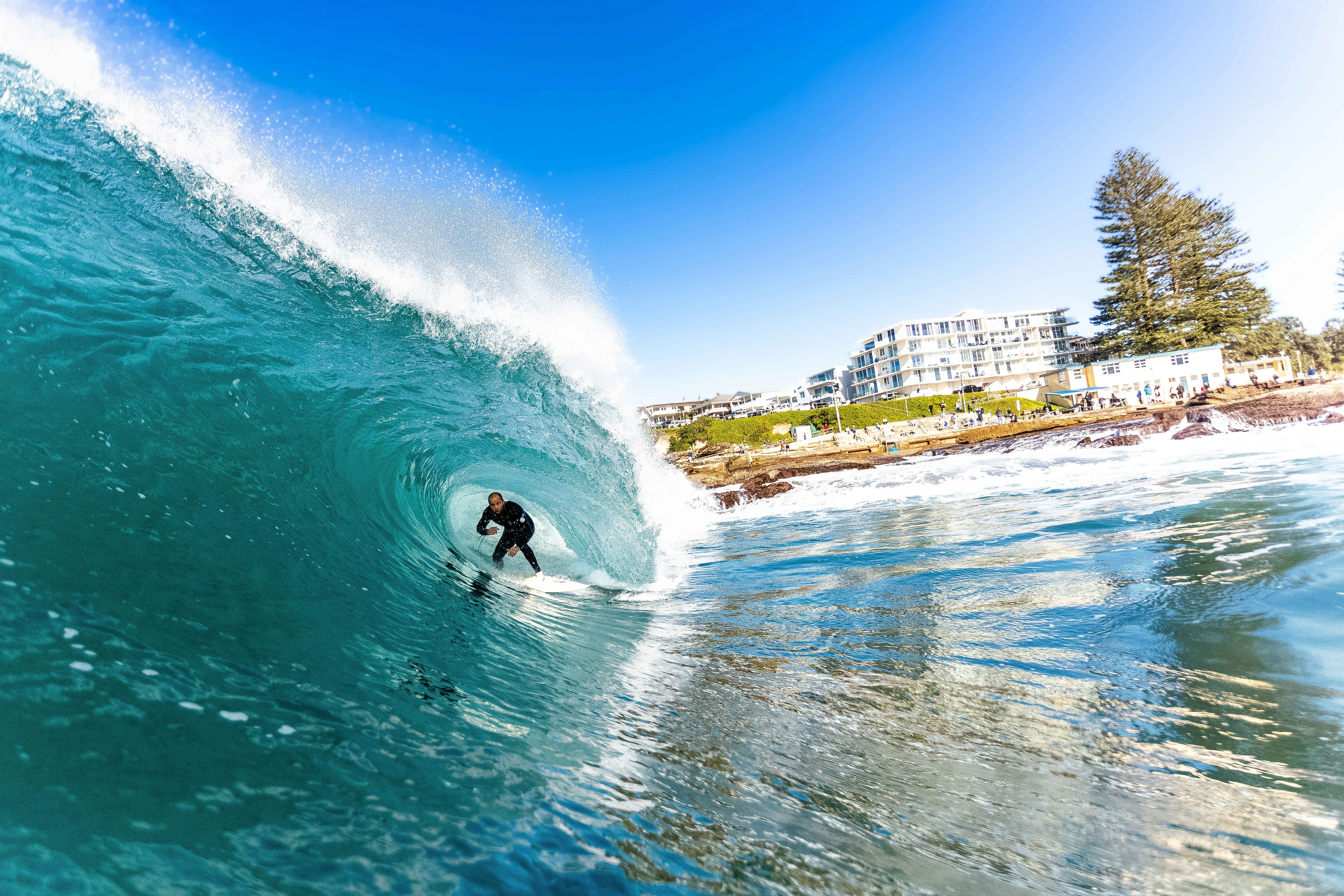 Surfer rides a massive wave inside a barrel photo – Free Beach Image on ...