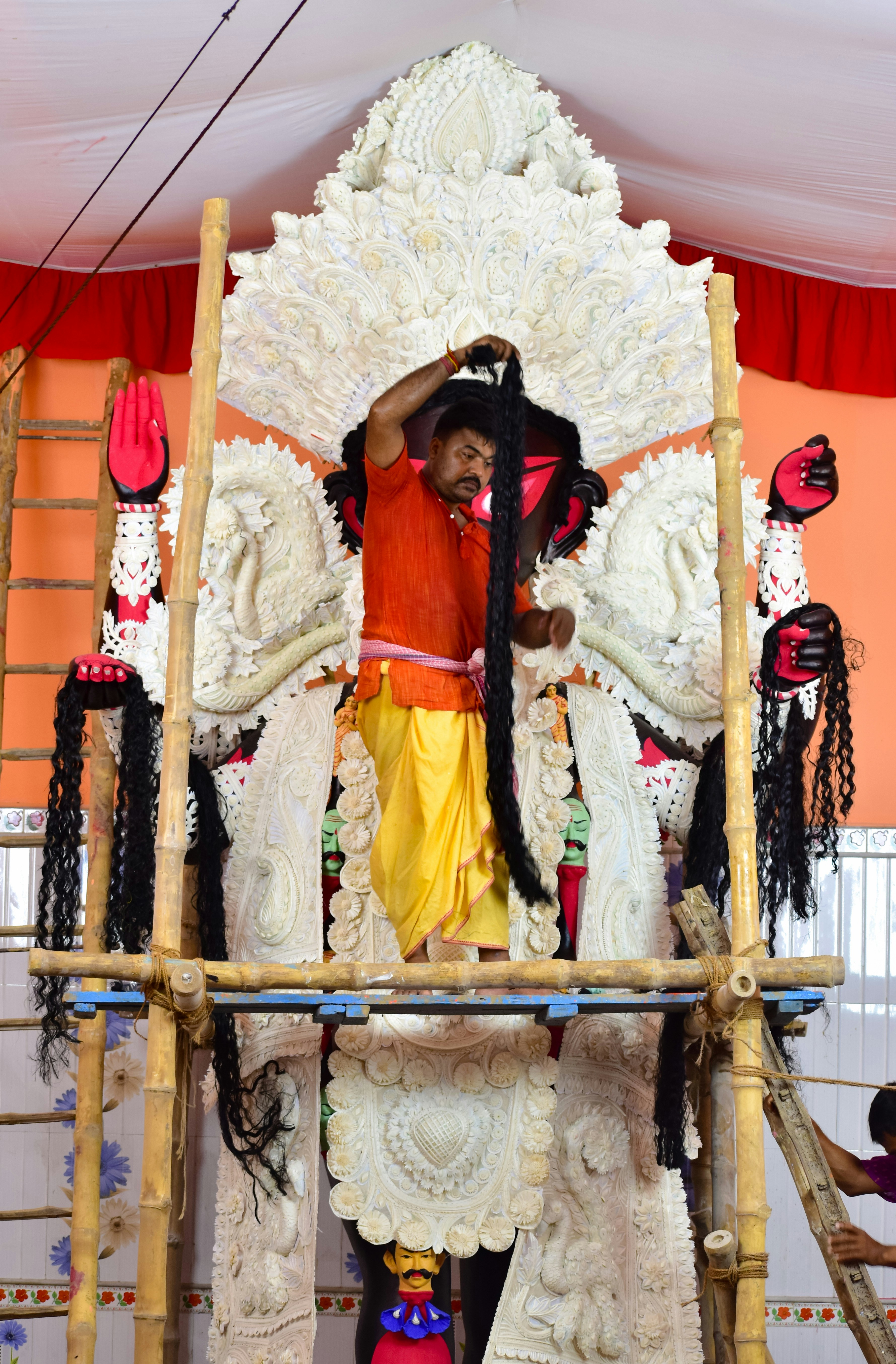 Braiding the Sacred Strands on a Carved Temple Carriage