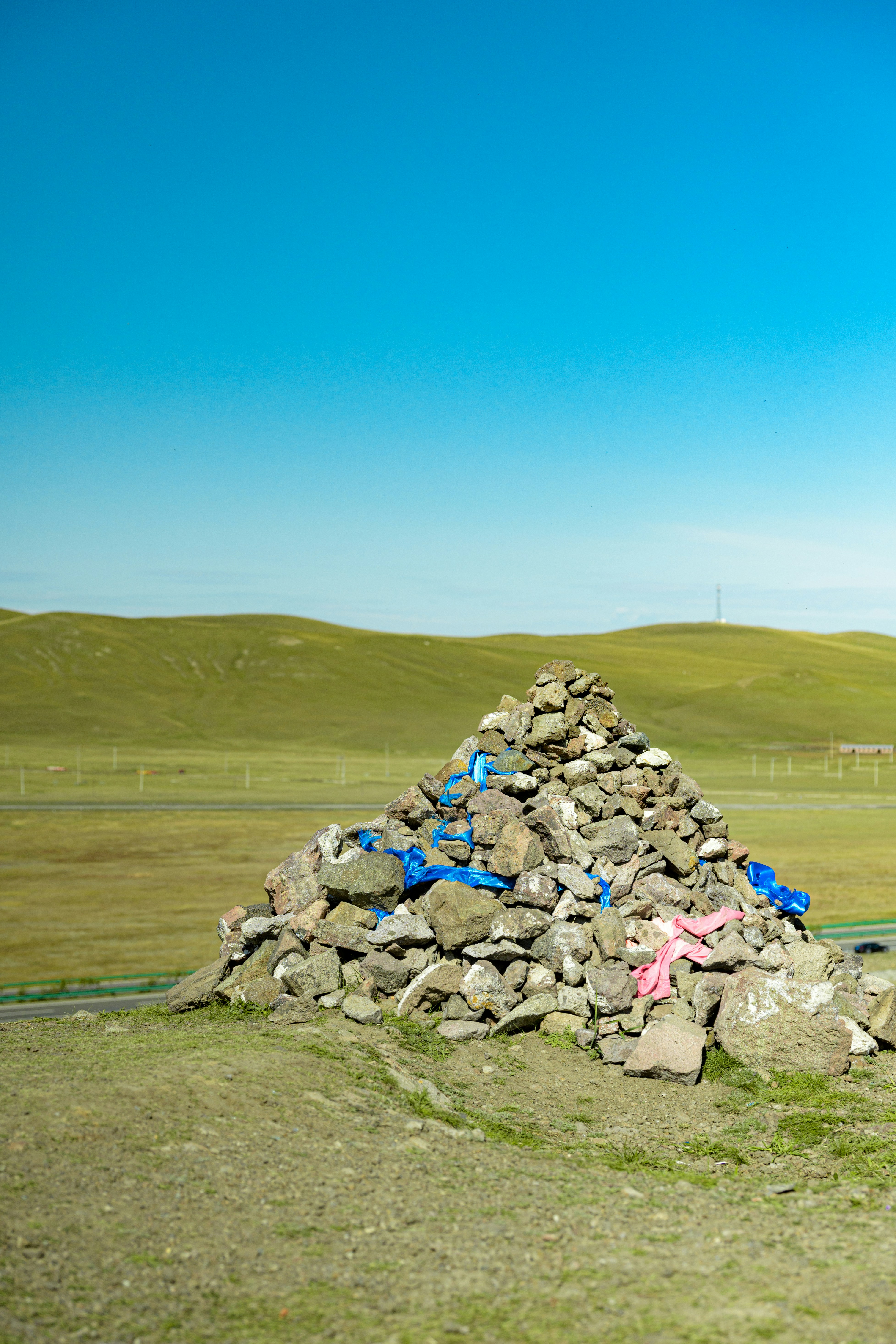 Ribbons on a Cairn: Colorful Accents in a Quiet Prairie