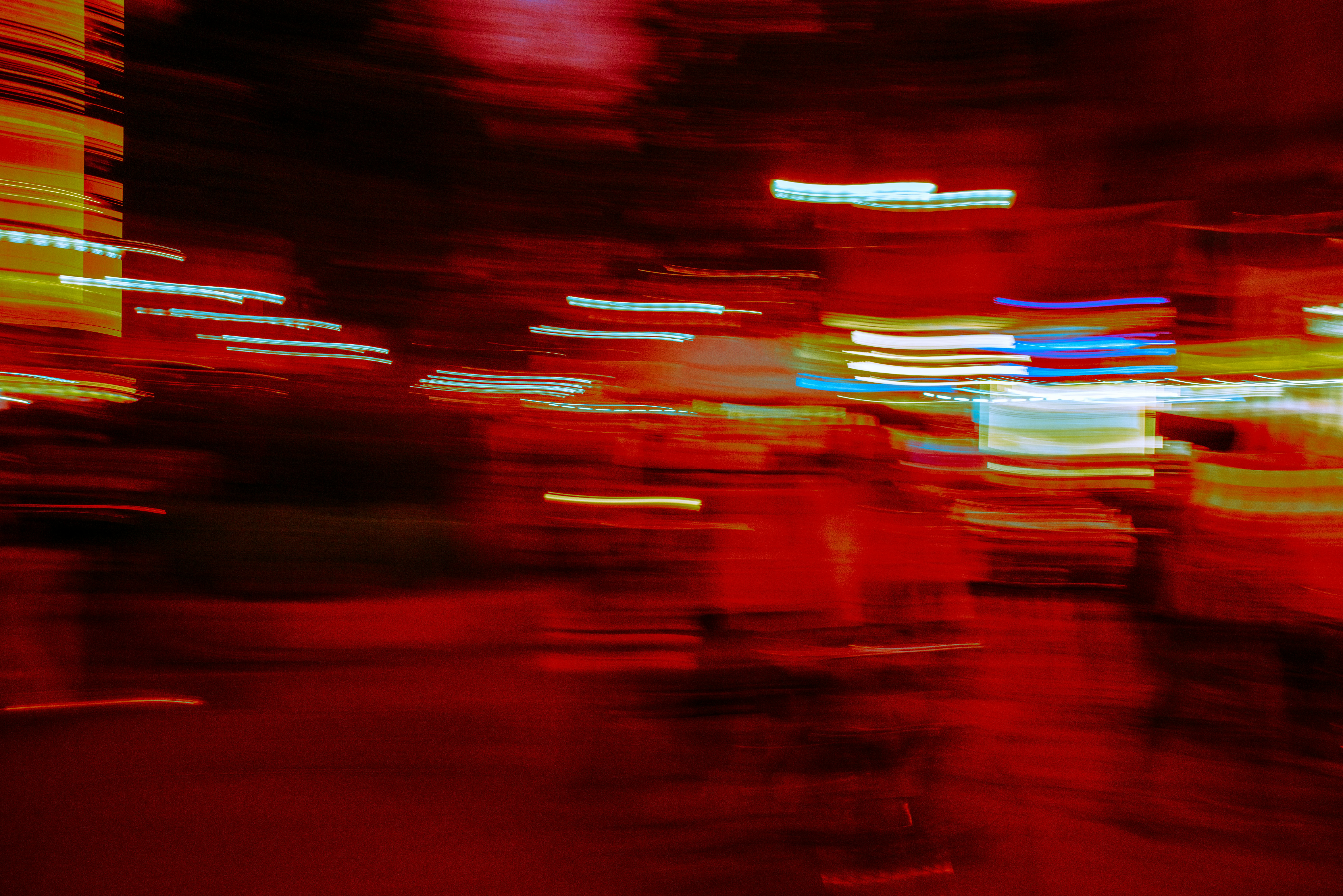 Blurred red lights of a city at night photo – Free Abstract Image on ...
