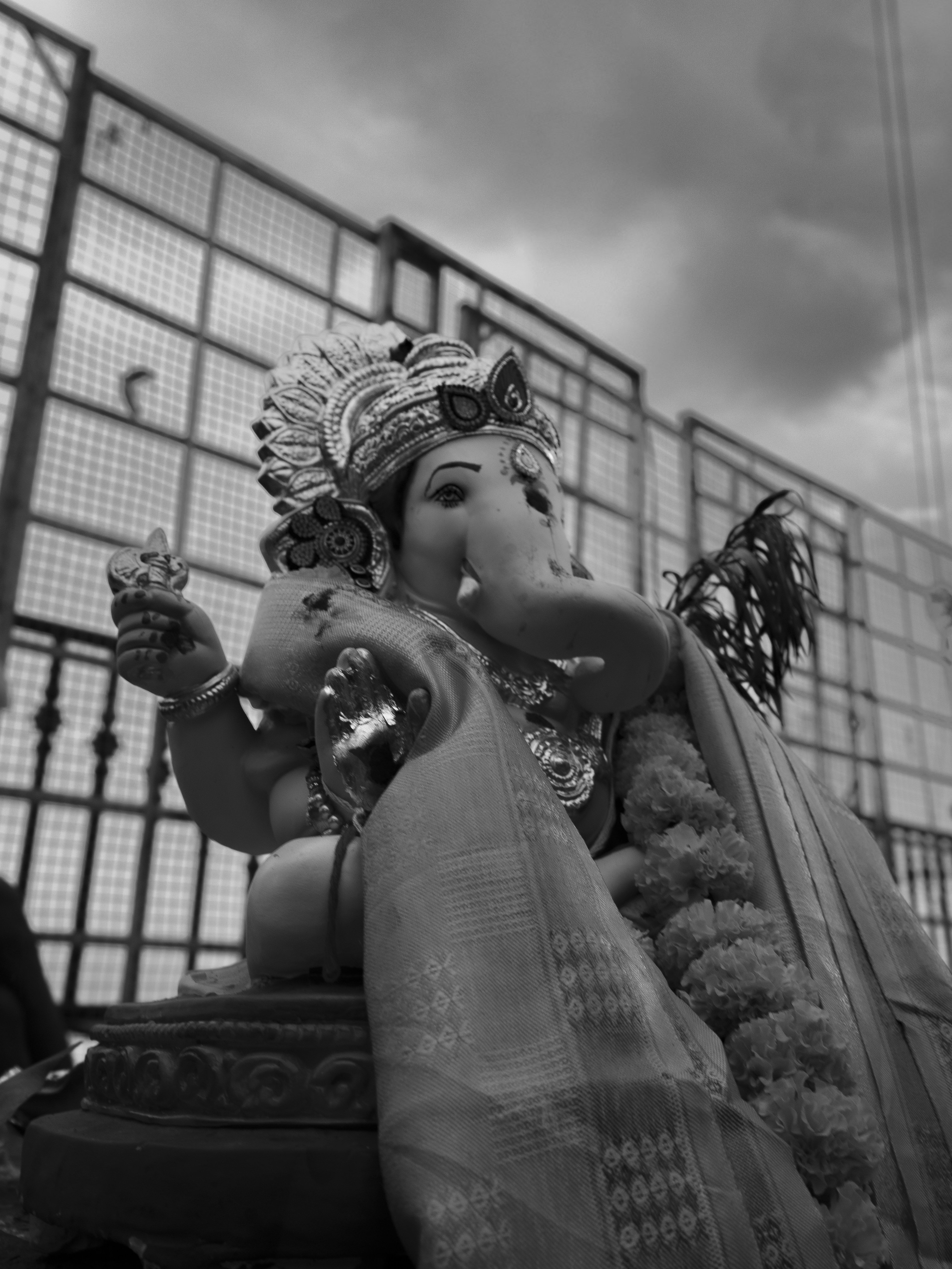 Grayscale Ganesha Under Lattice: An Ornate Reverence