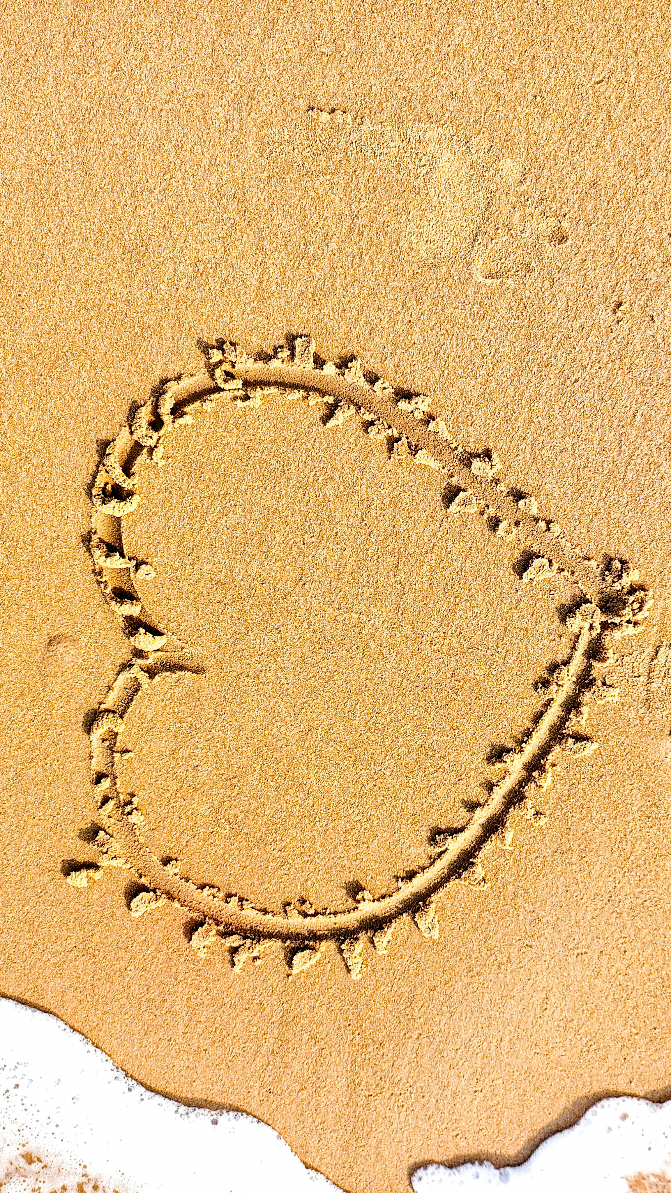 Heart drawn in sand at the beach photo – Free Beach Image on Unsplash