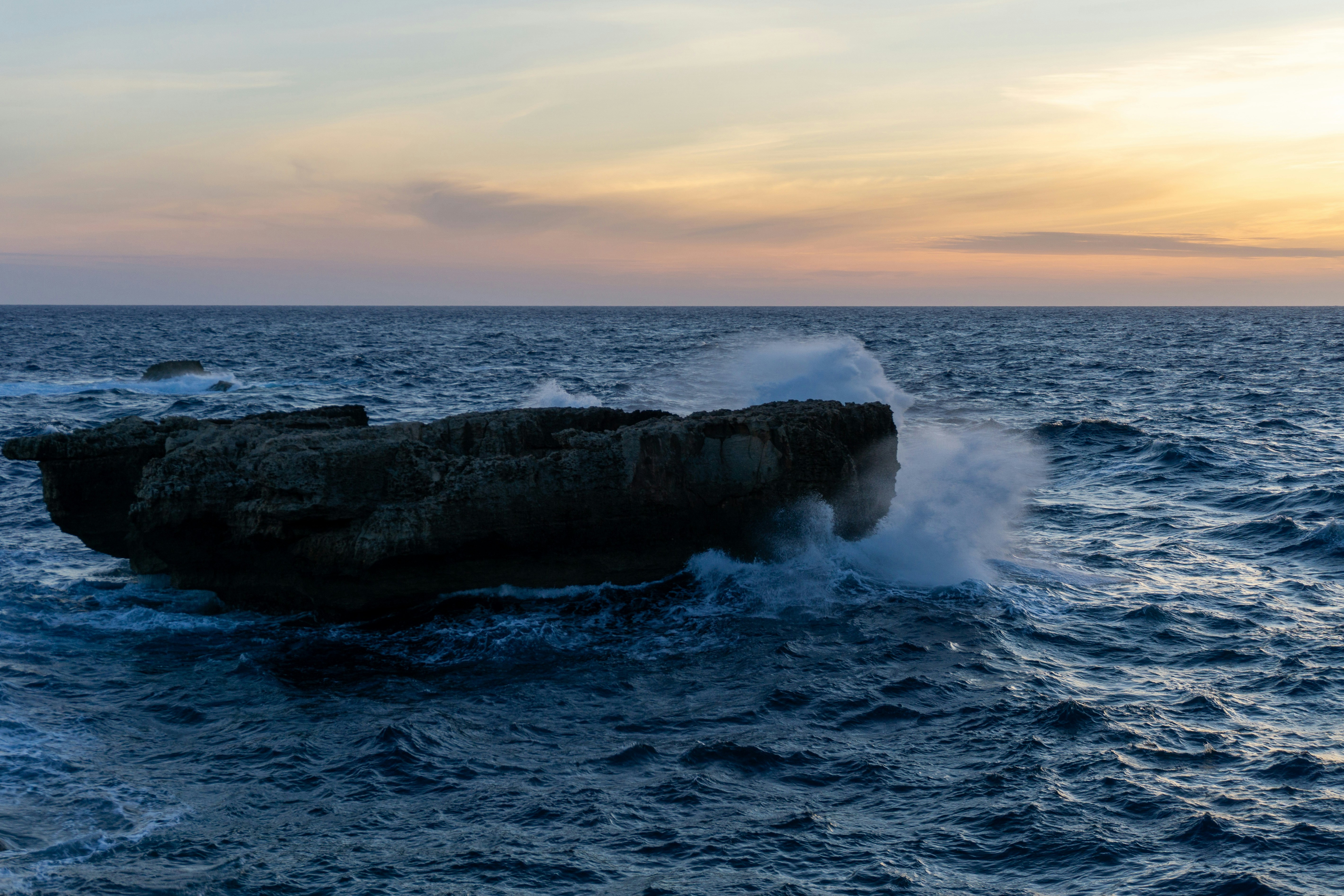 Whispers of the Ocean: A Rocky Embrace