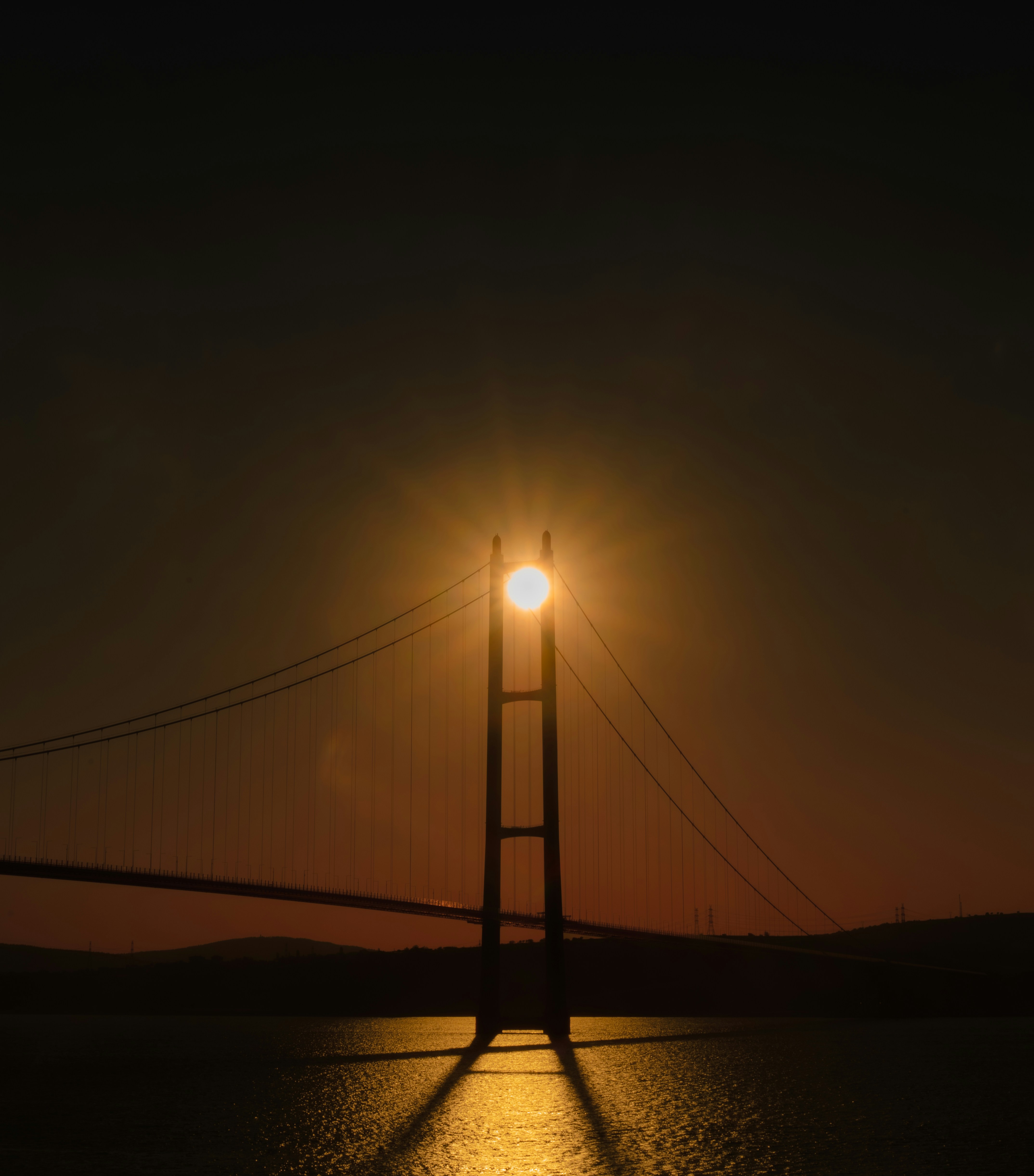 Bridge of Light: A Sunset Silhouette