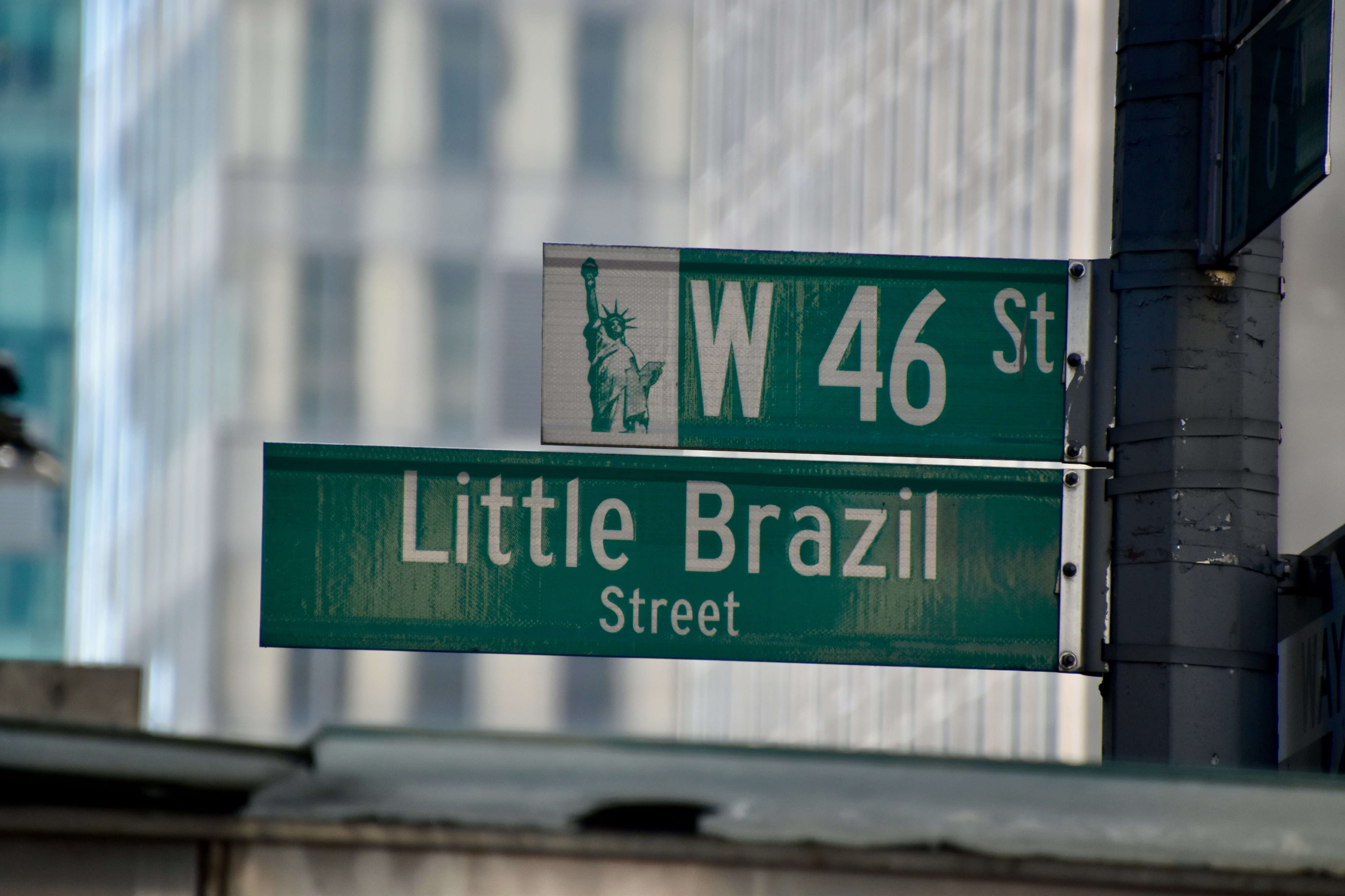 Midtown Signpost: W 46th Street Meets Little Brazil