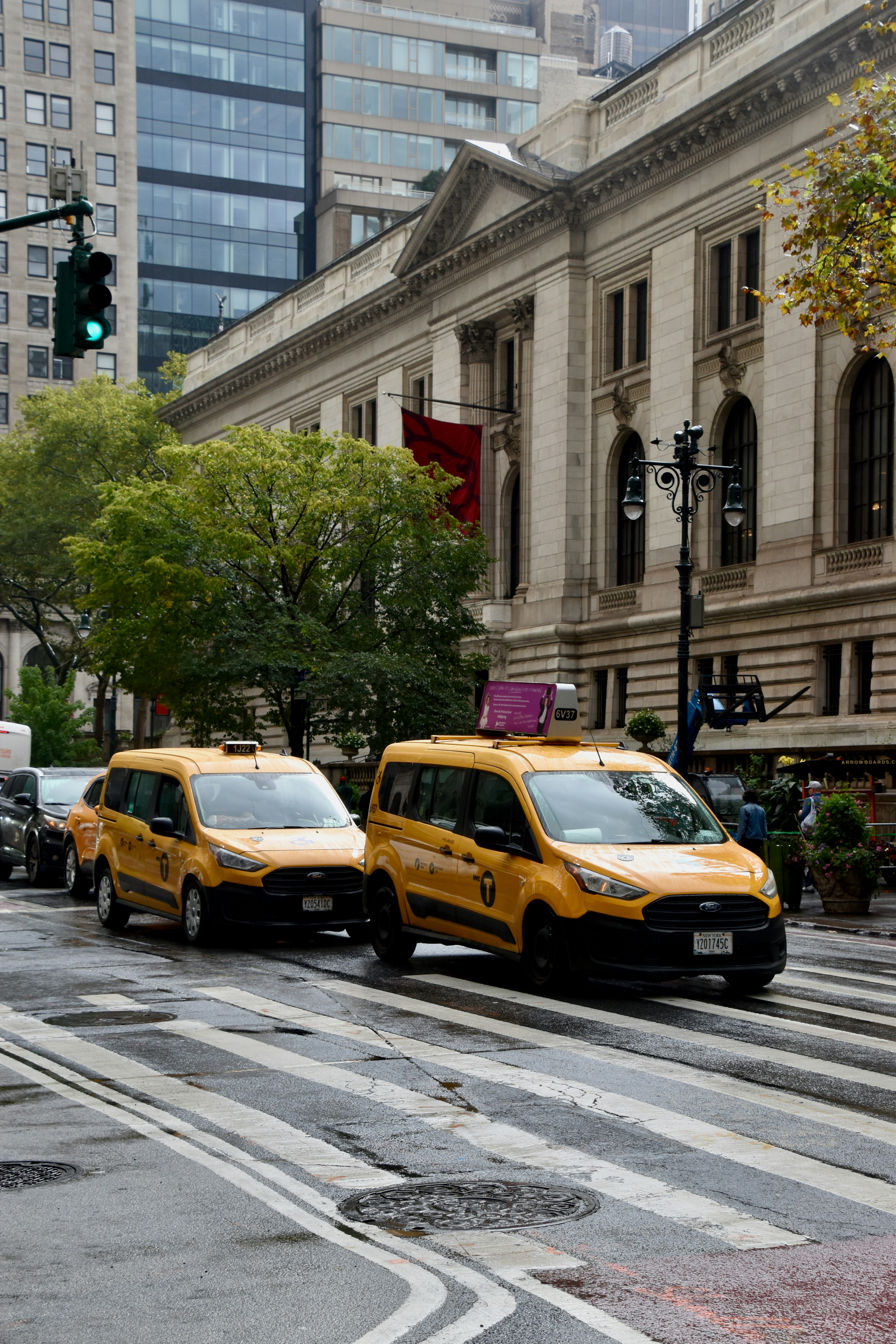 Crosswalk Convergence: Yellow Cabs and a Neoclassical Facade