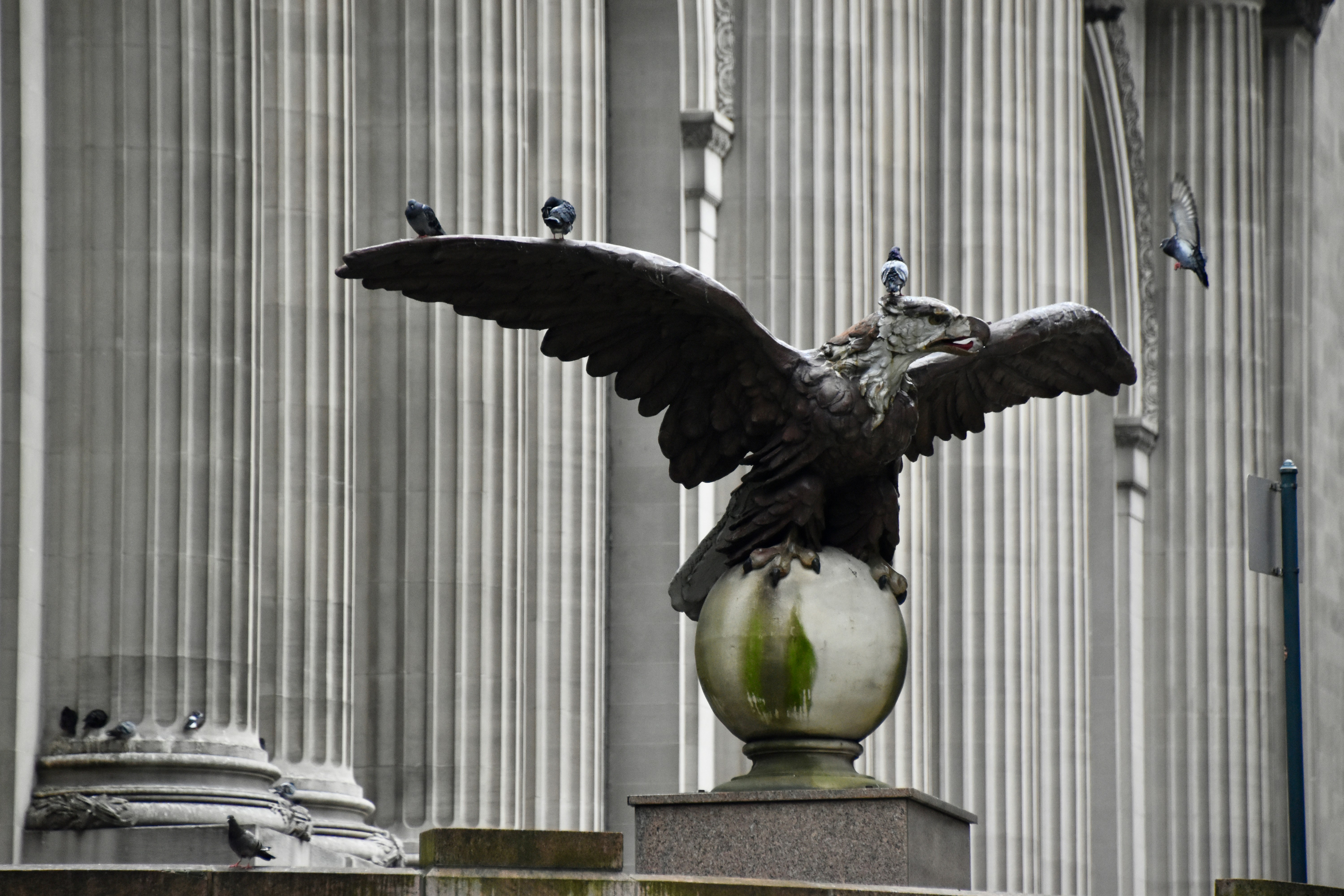Winged Vigil on a Marble Globe