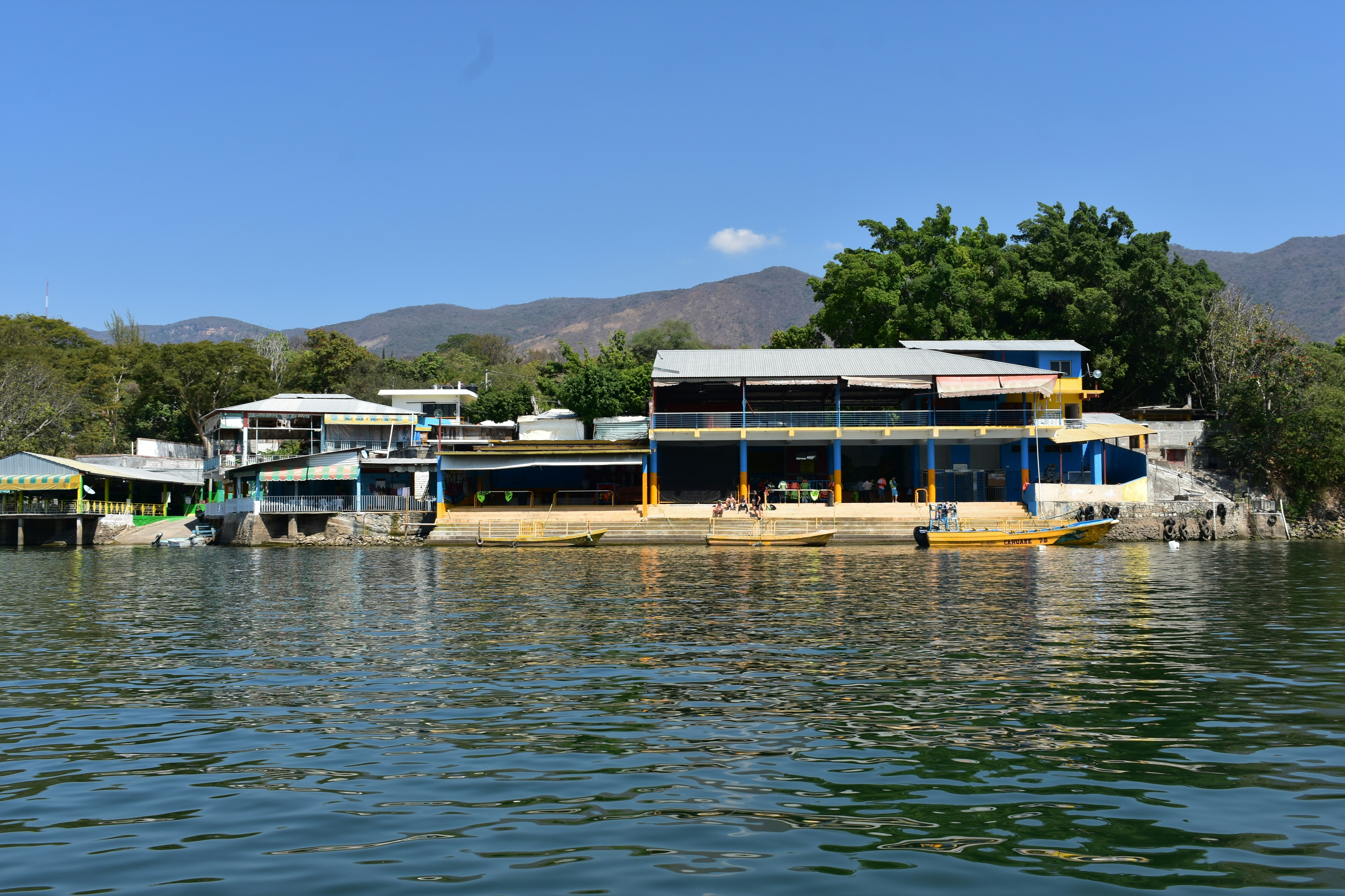 Buildings along a calm body of water