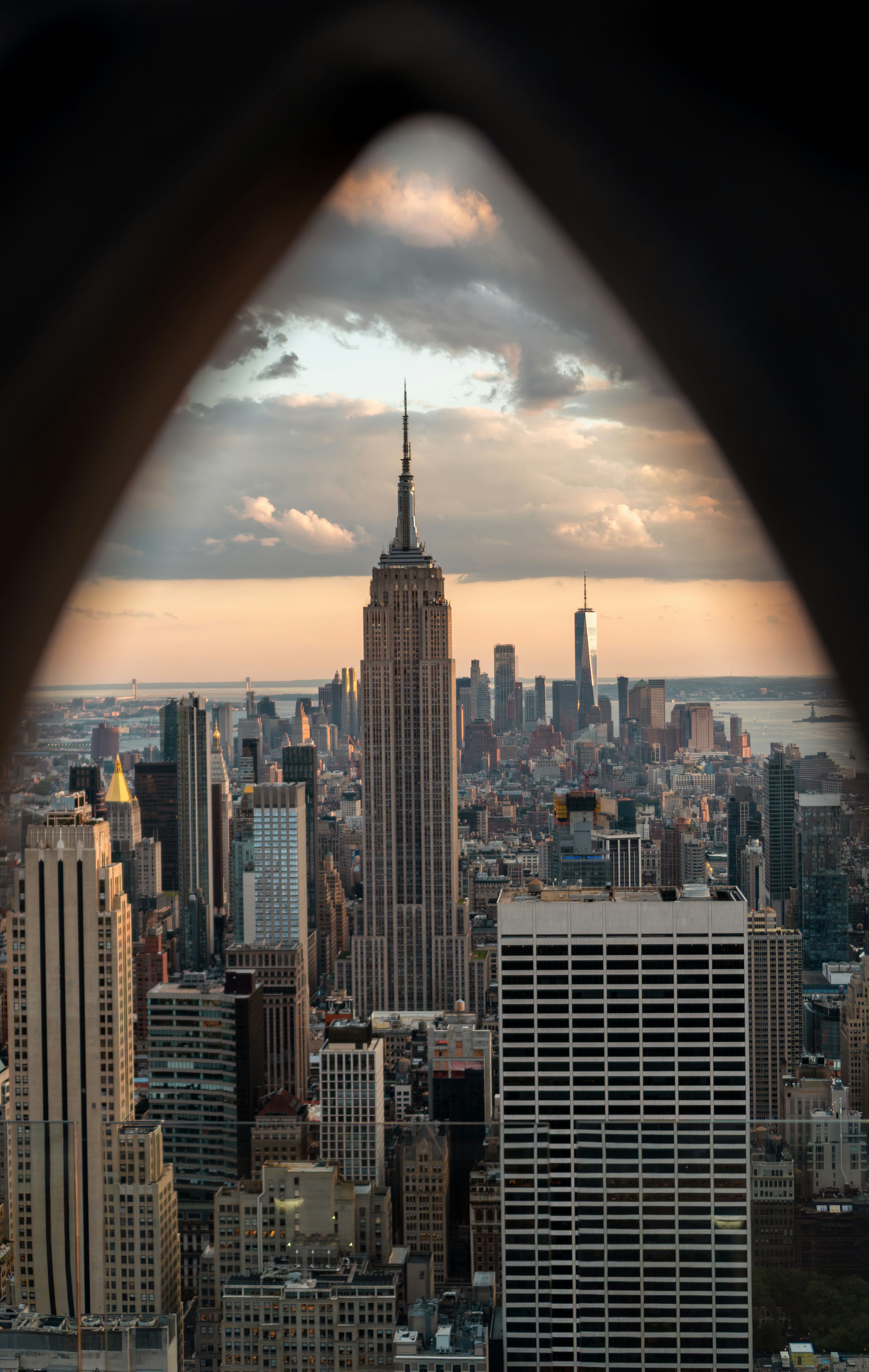 Empire in the Glass: A Downtown Silhouette Framed by a Narrow View