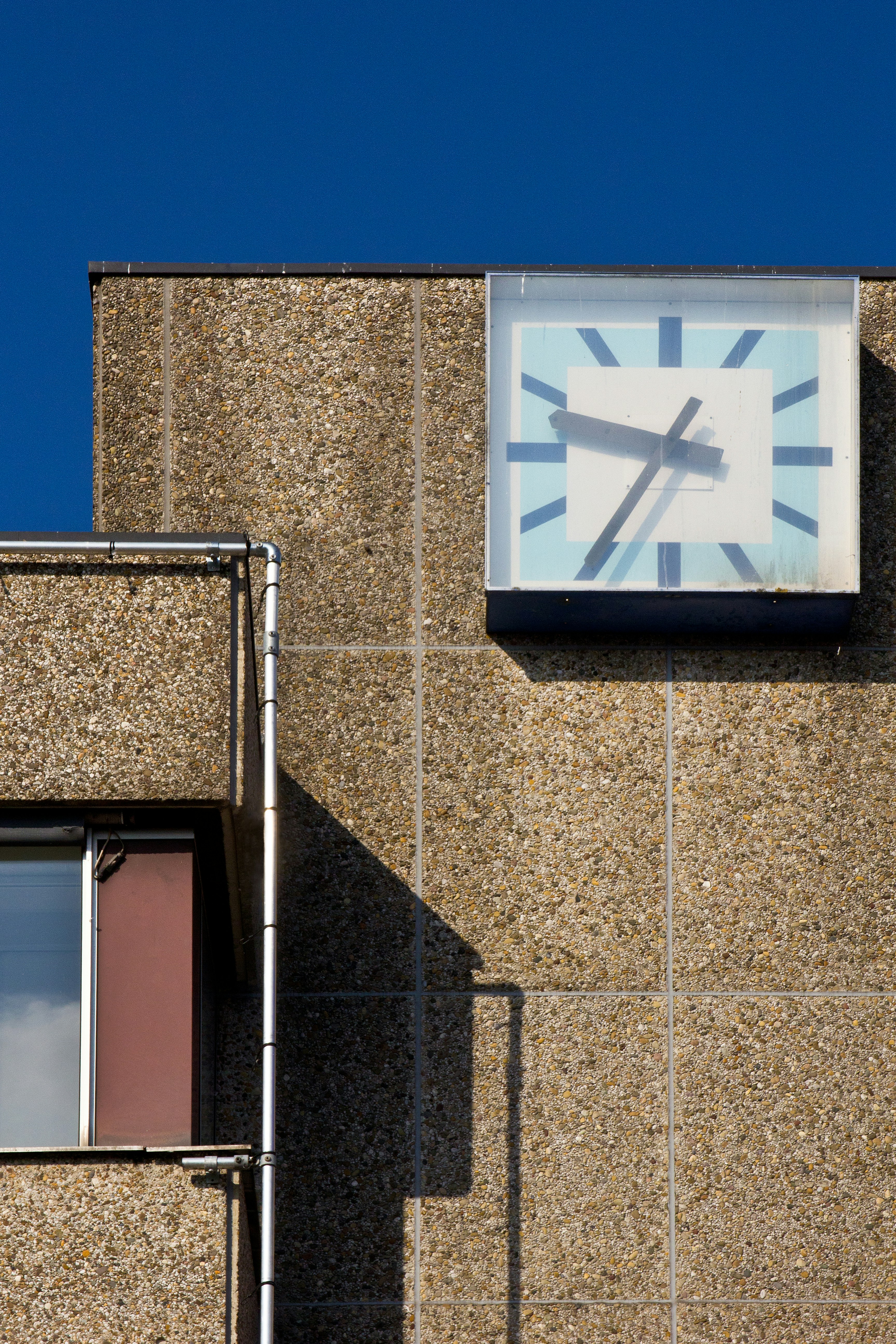 Time's Silent Witness on Concrete Facade