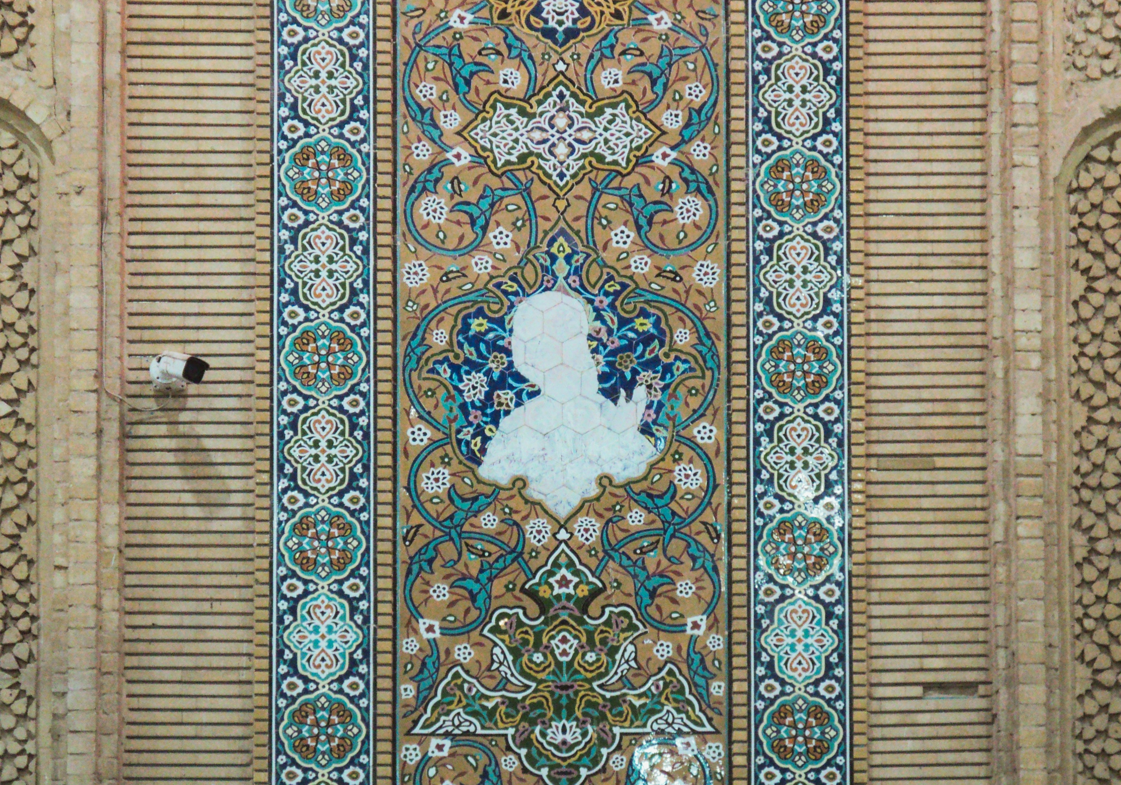 Revealing the Unseen... | Intricate mosaic tile art with a central bust silhouette.