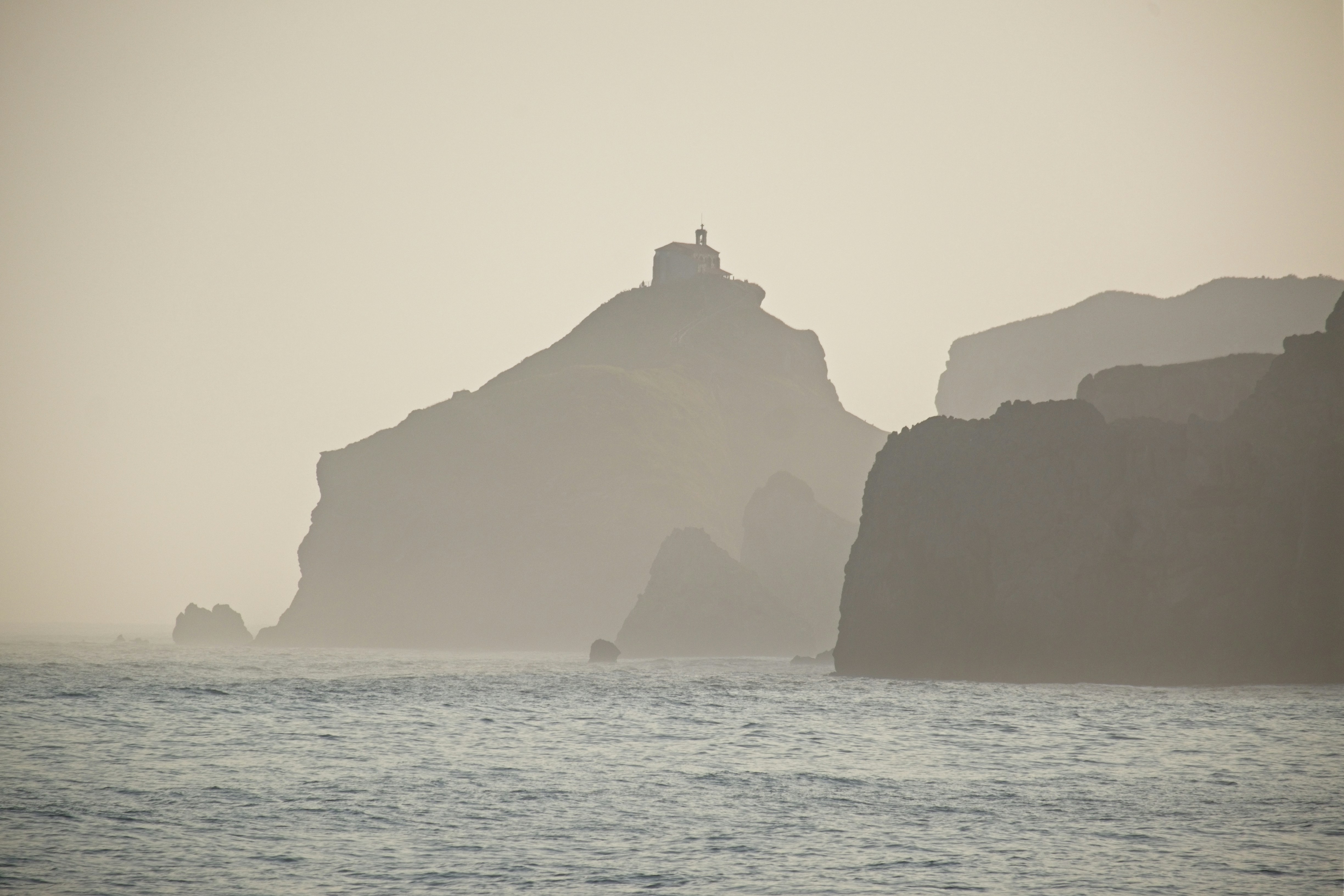 Whispers of the Coastline: A Lighthouse in the Mist