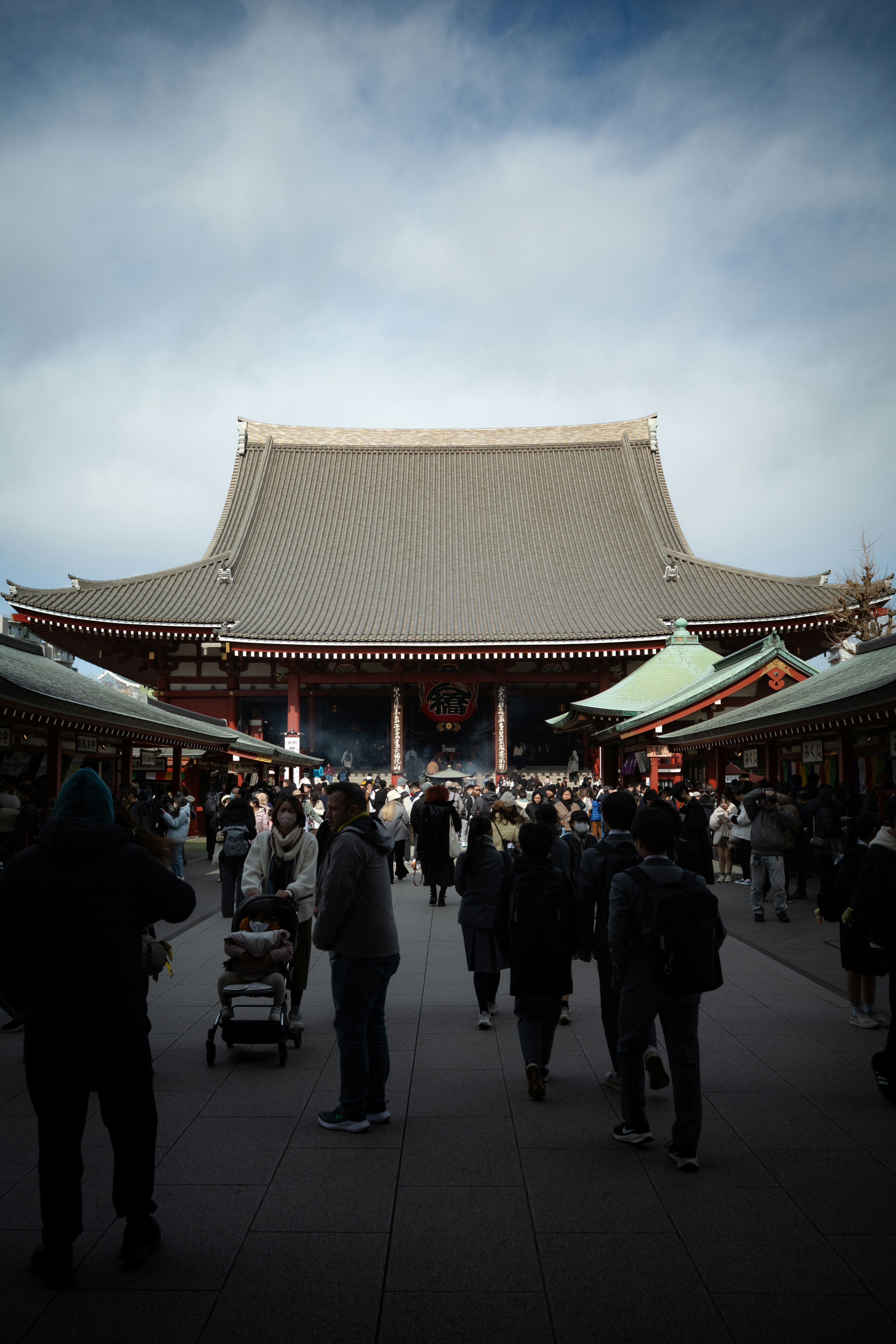 Temple Courtyard Amid a Crowded Pathway