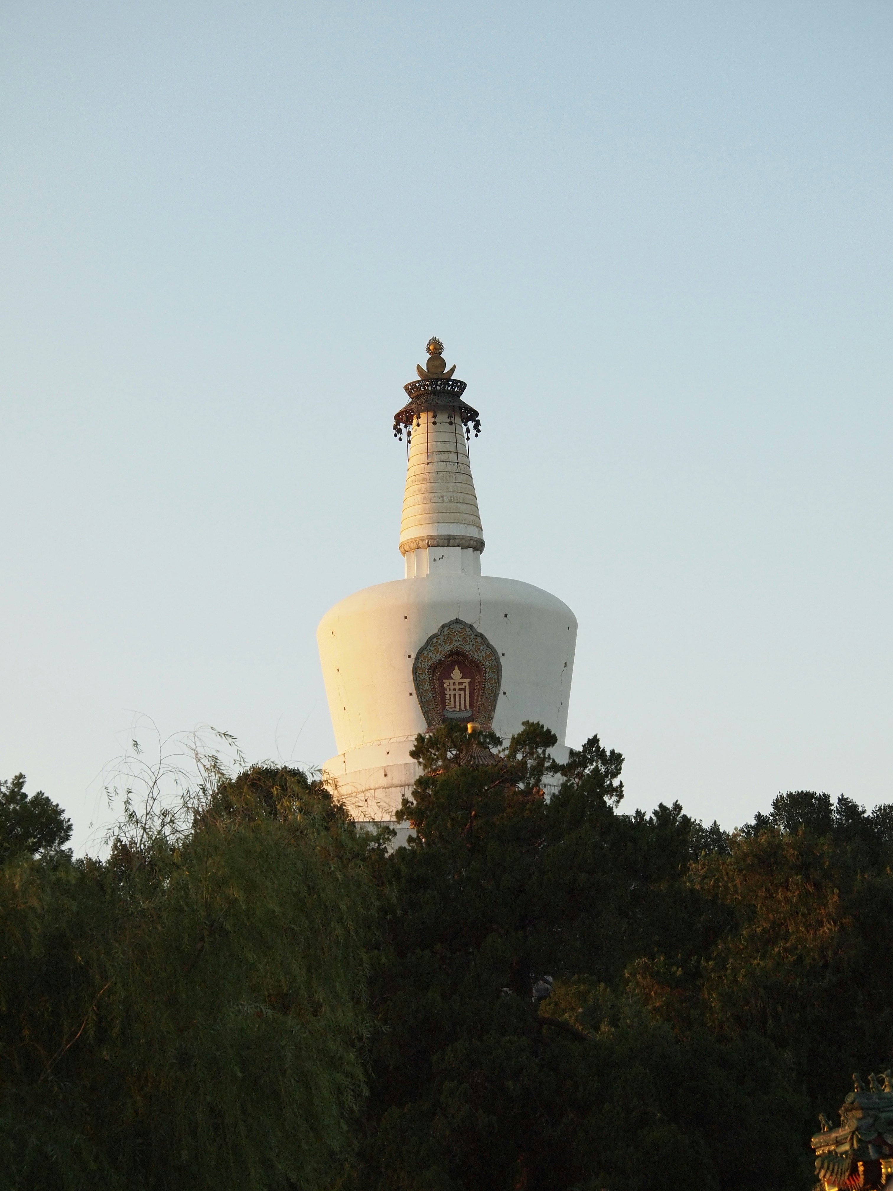 Whispers of Tradition: The White Pagoda's Silent Watch