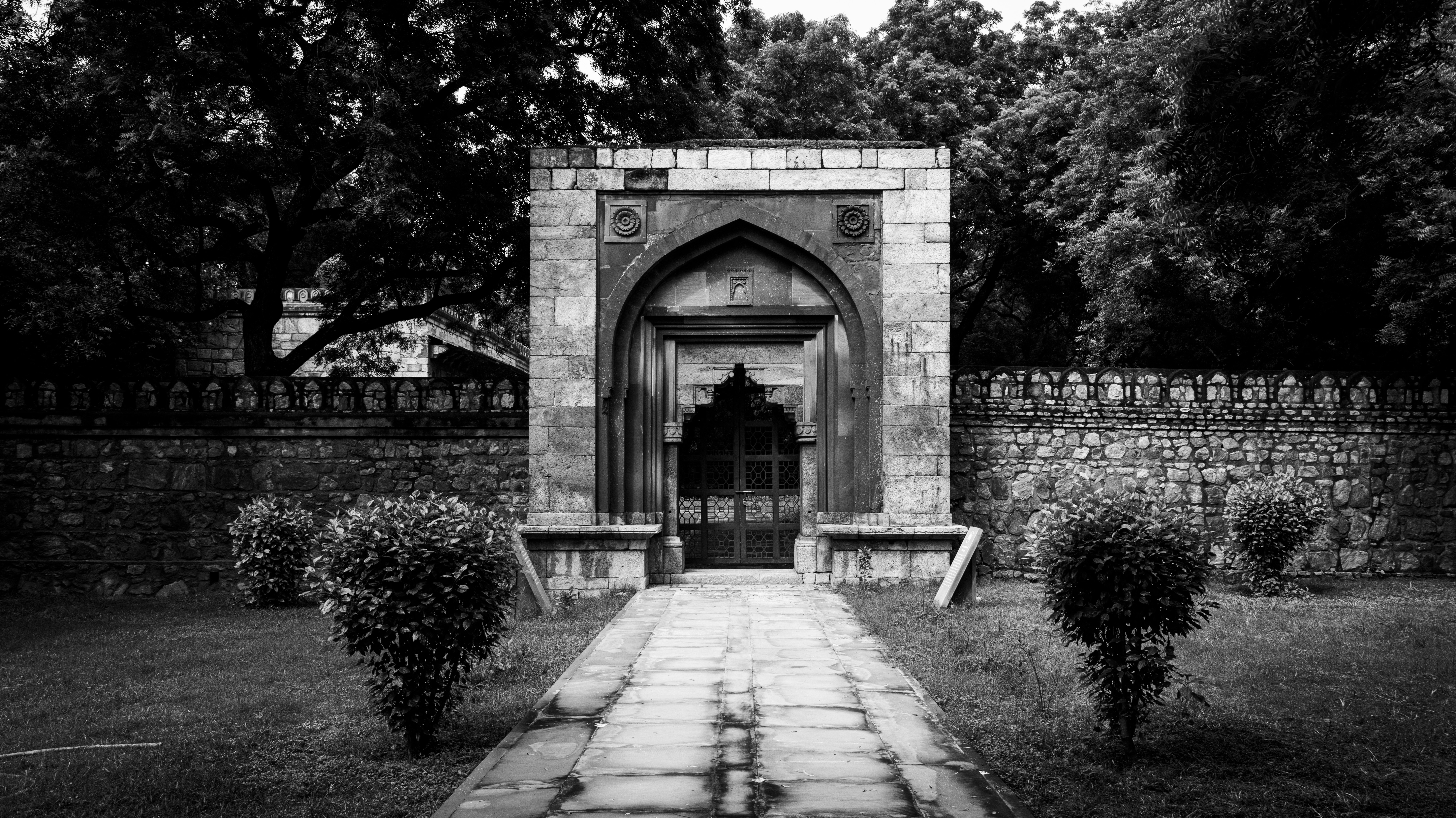Symmetrical Archway in Monochrome: A Quiet Gate to the Garden