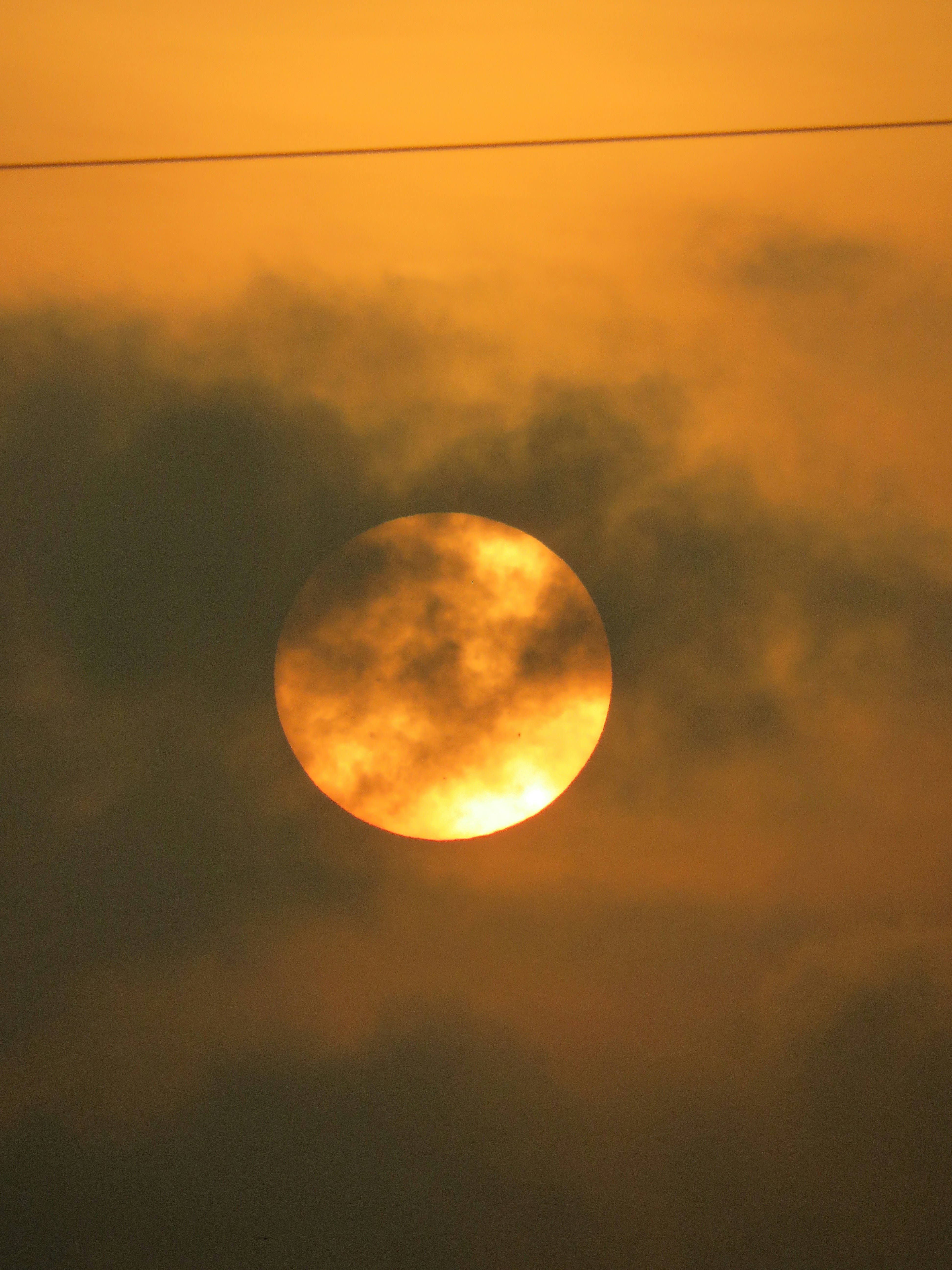 Golden Orb: A Celestial Embrace