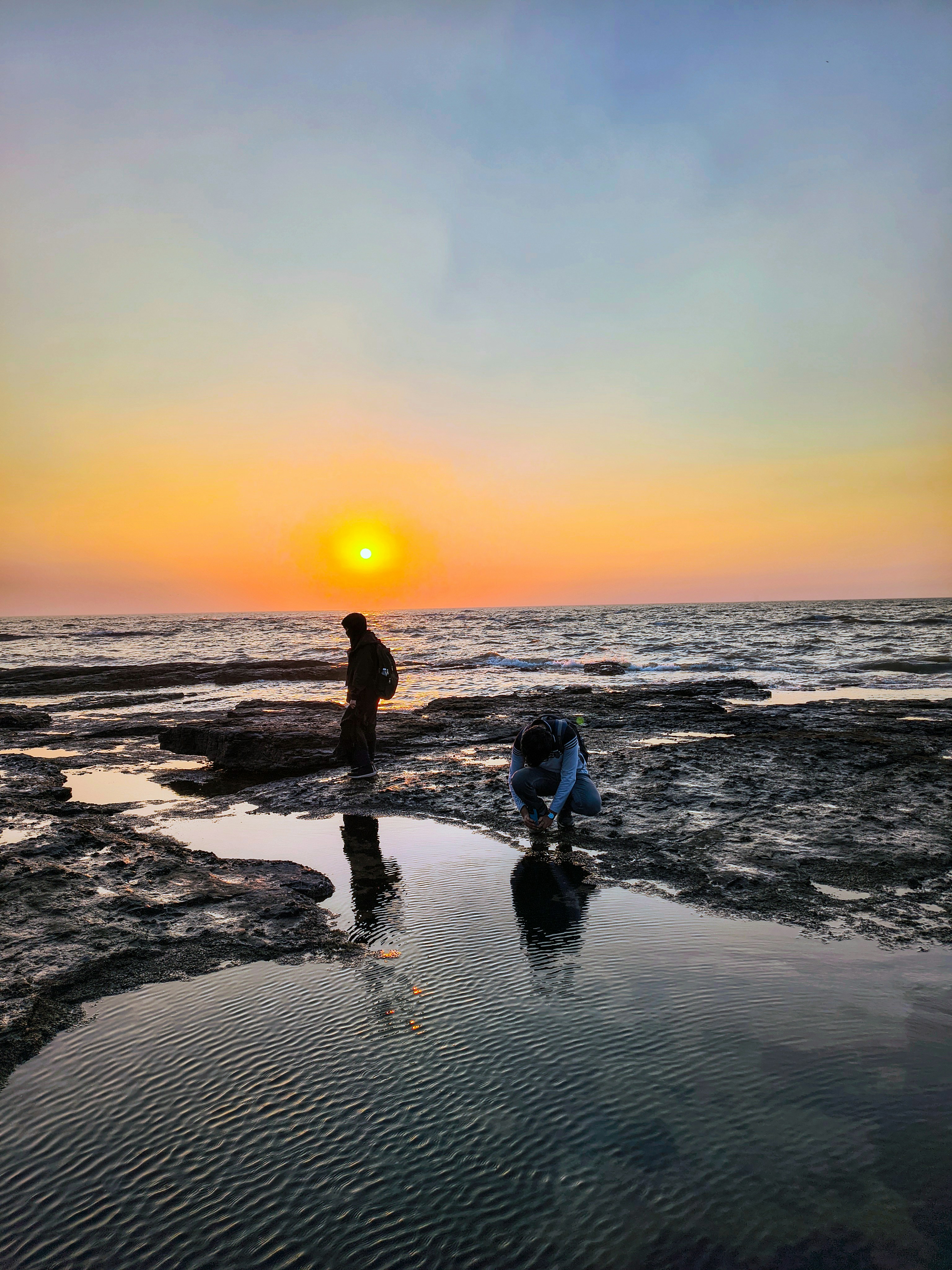 The sunset at the rocky shore of Mumbai.