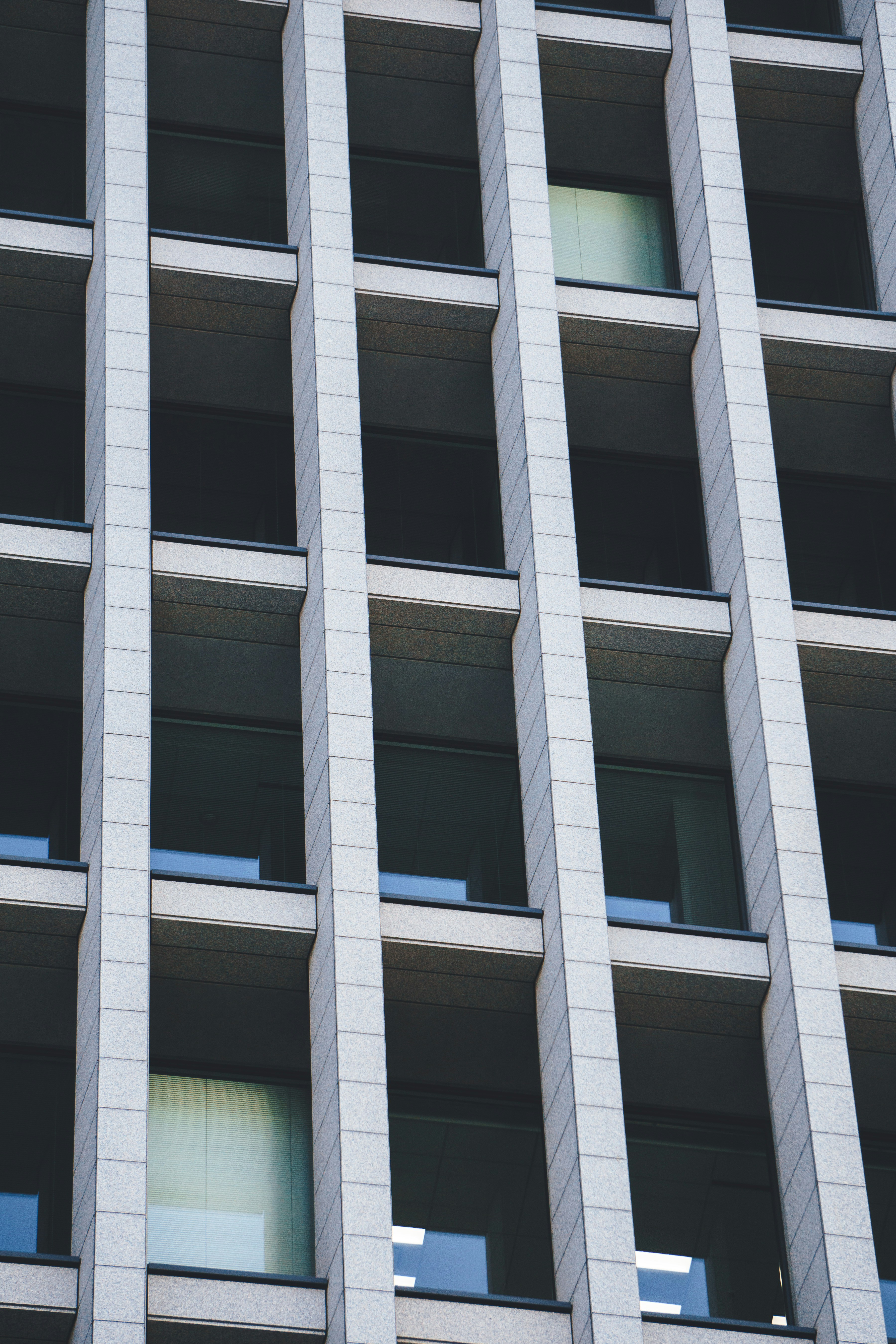 Modern building facade with geometric window patterns