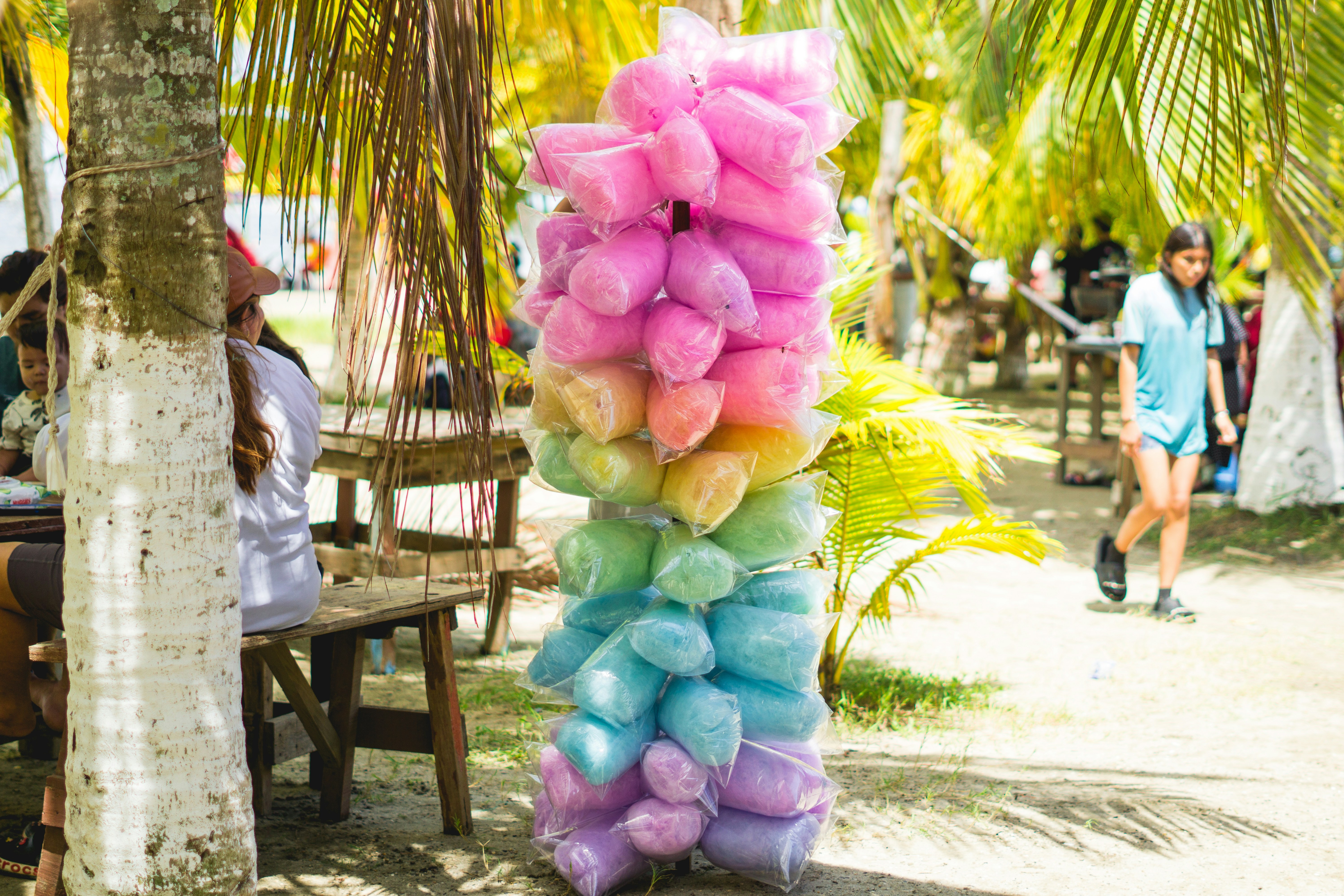 Whimsical Cotton Candy Tower Amidst Tropical Vibes
