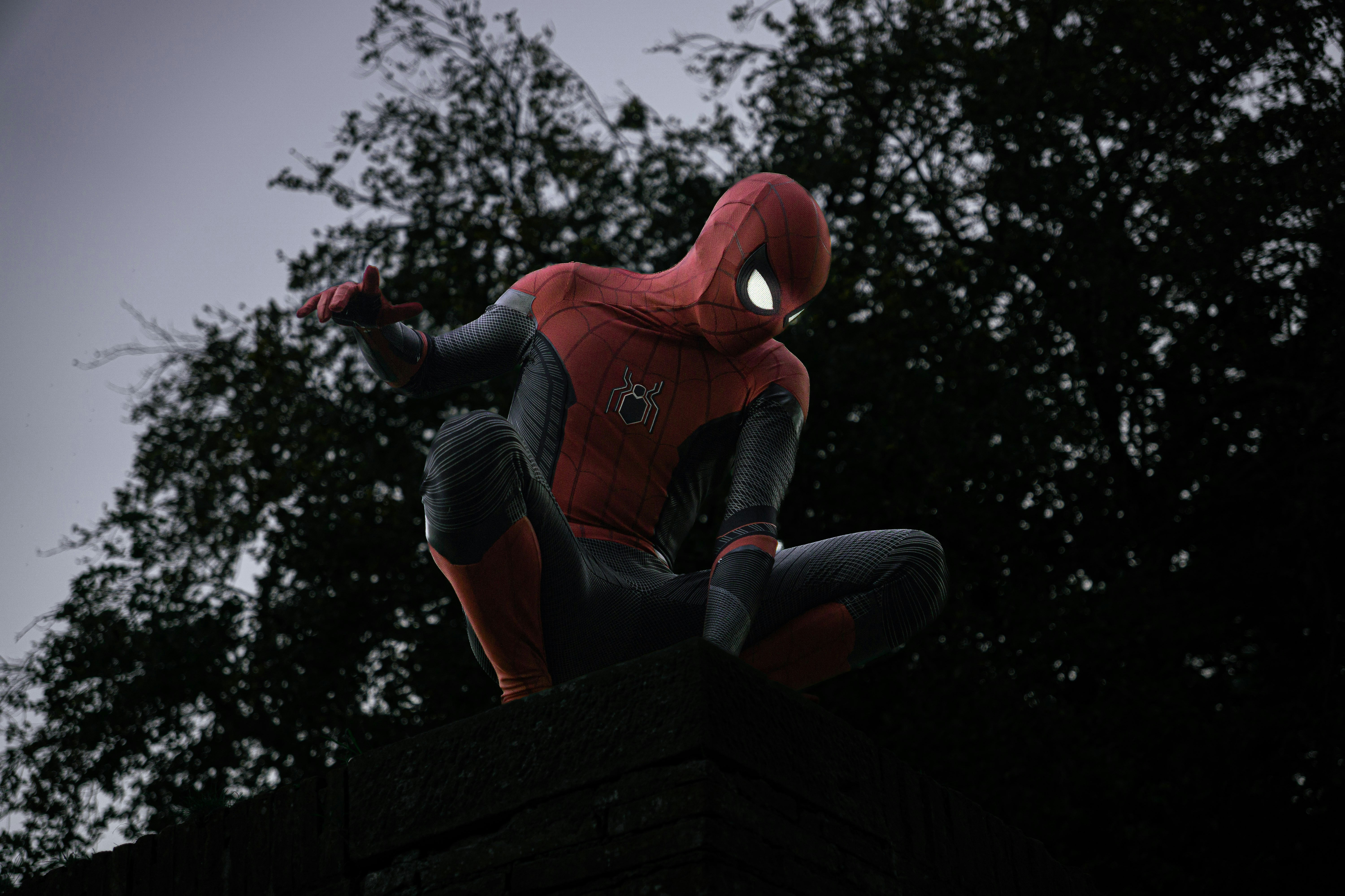 Nightwatch on the Beam: Spider-Man Crouches Over a Quiet Rooftop