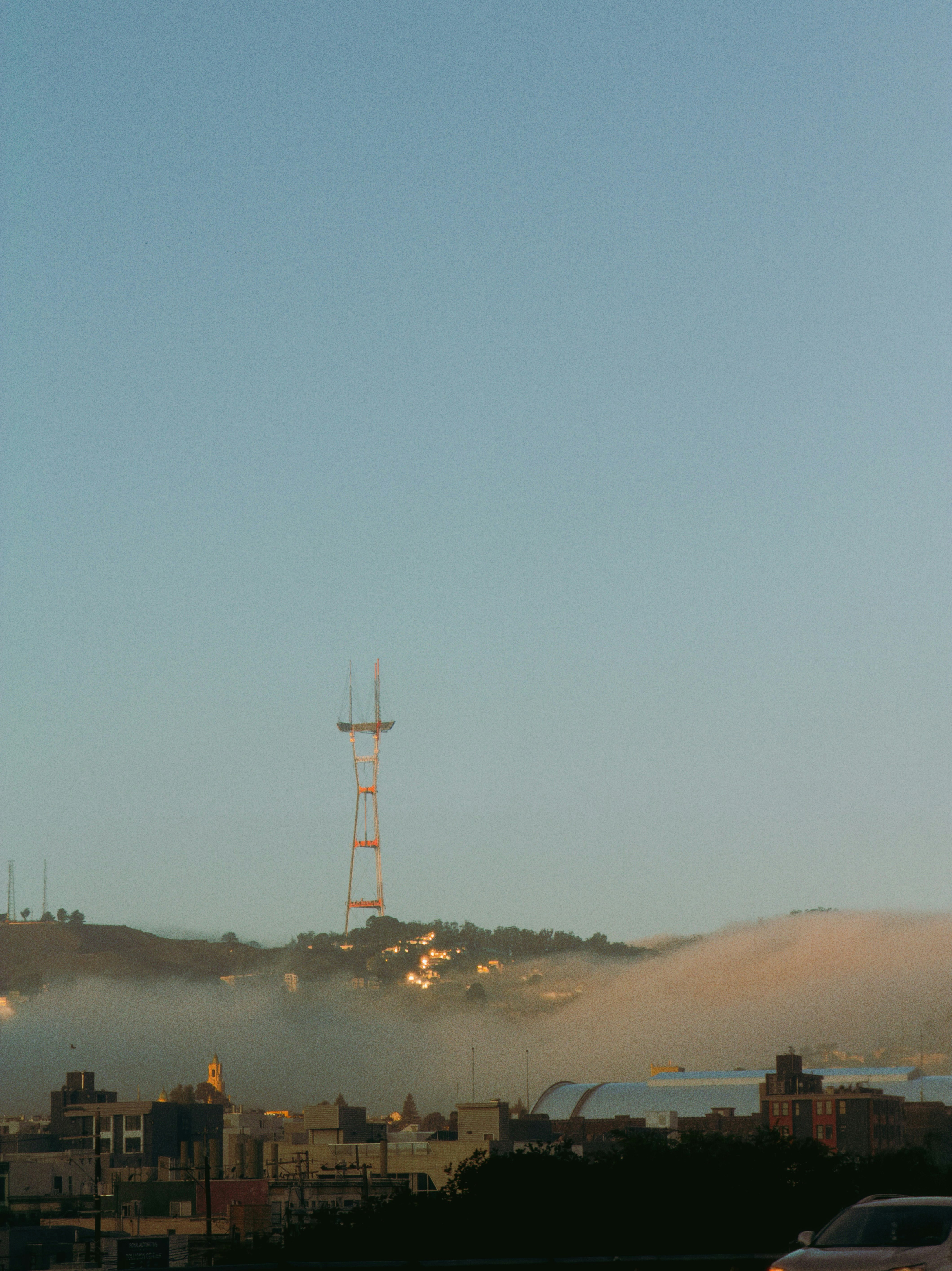 Whispers of Fog: The Skyline's Embrace