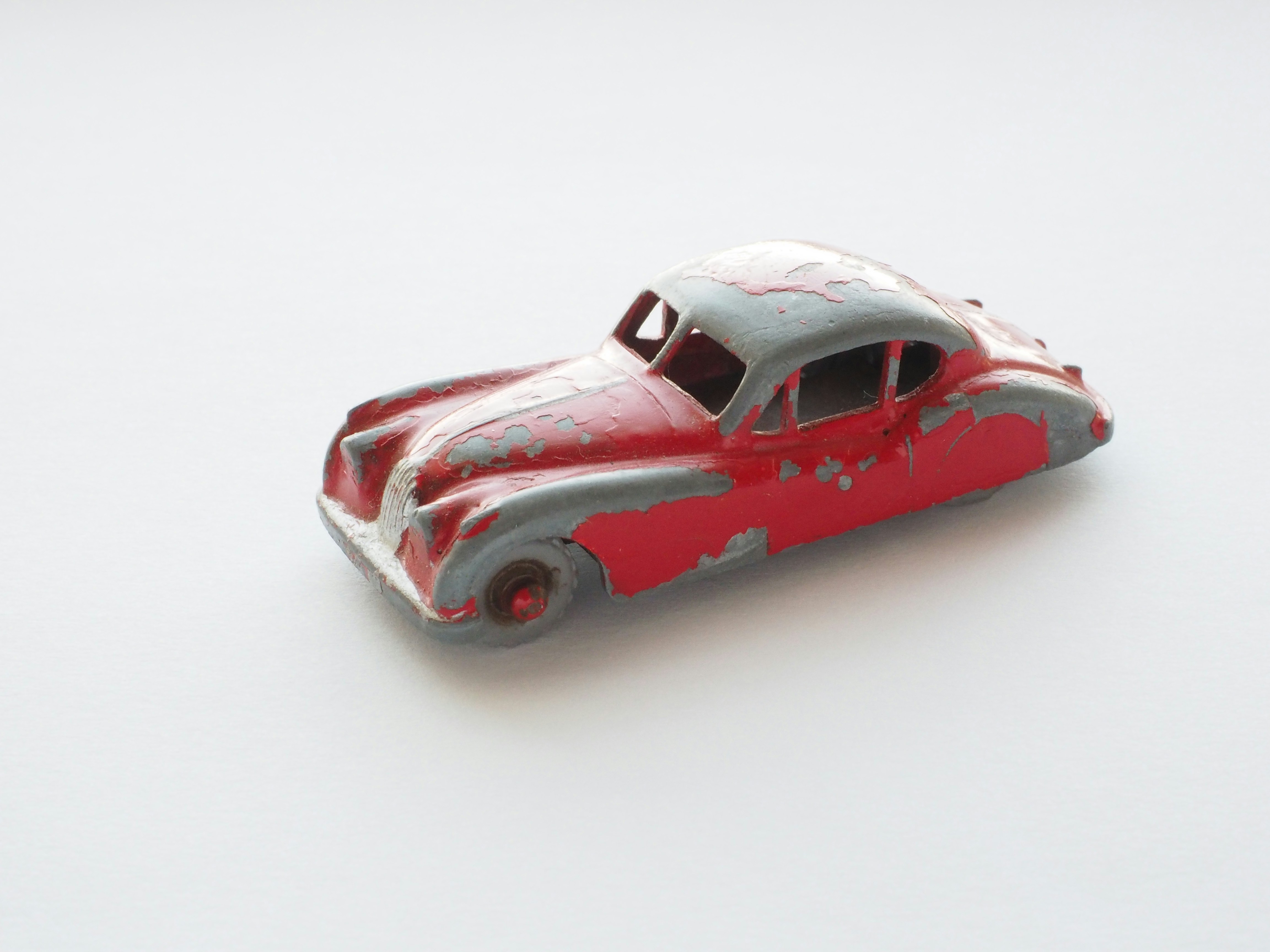 Nostalgic Ride: A Vintage Toy Car's Tale