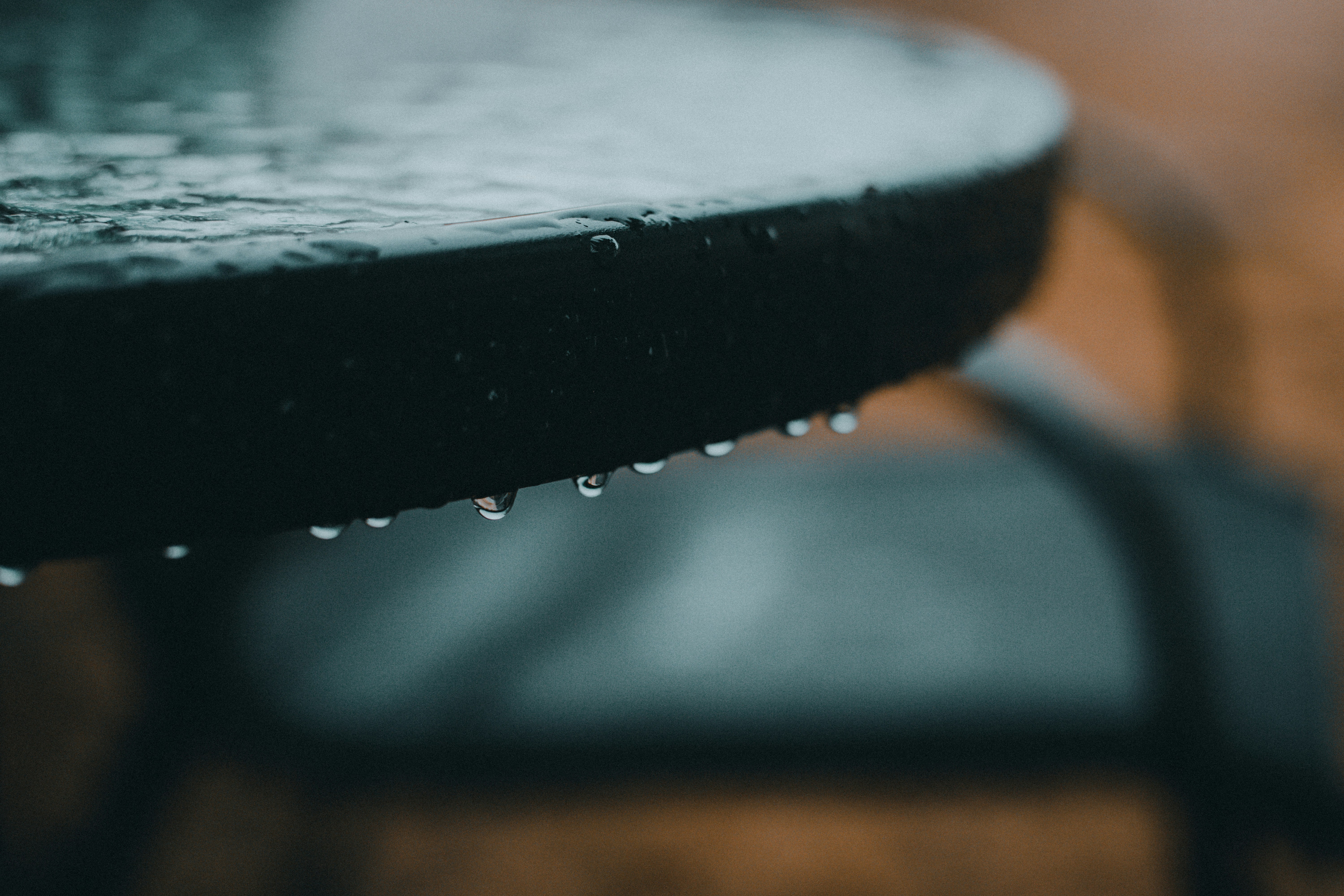 Raindrops falling from a dark table edge. photo – Free Texture Image on ...