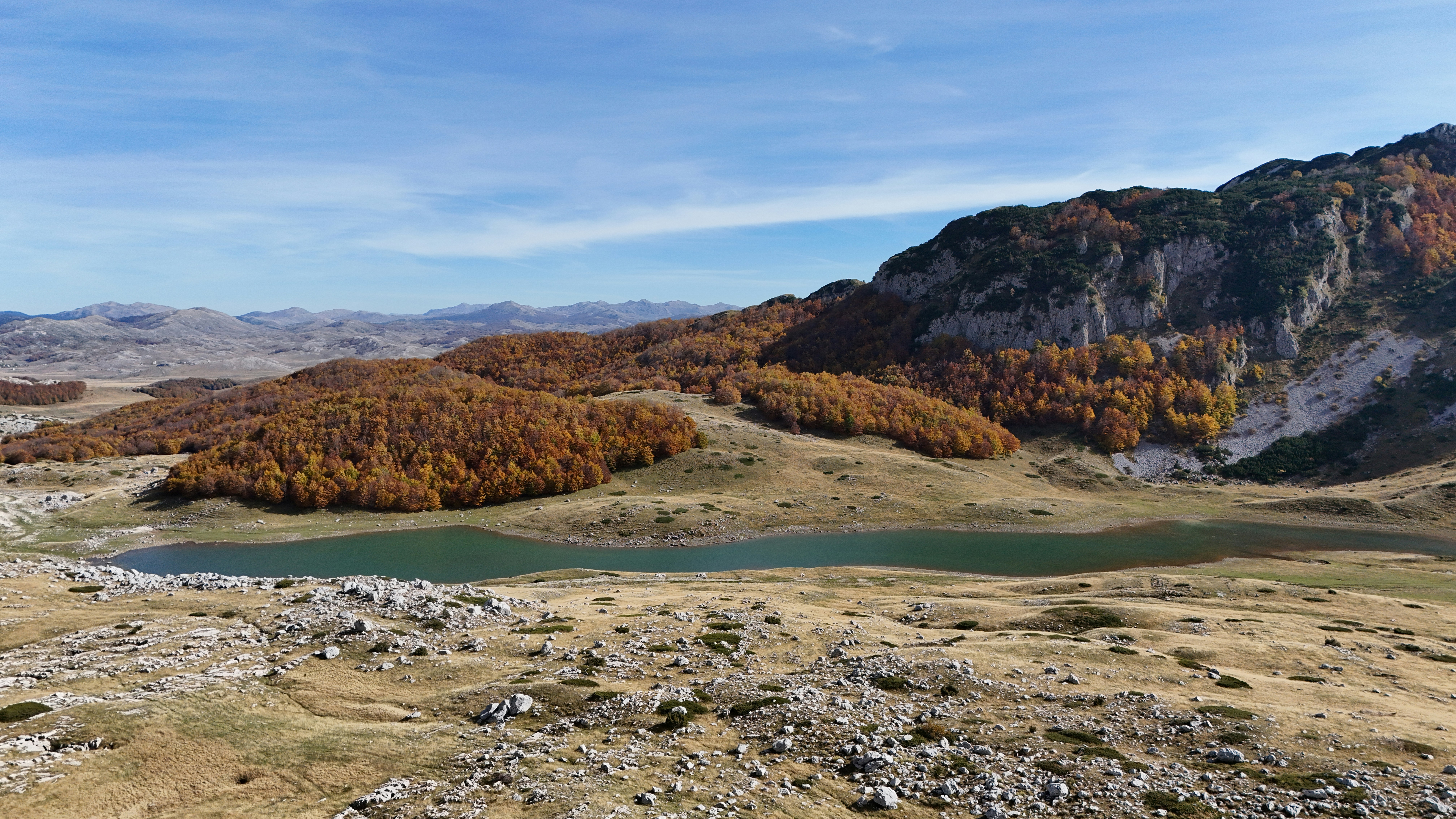 Autumn's Embrace Over Serene Waters