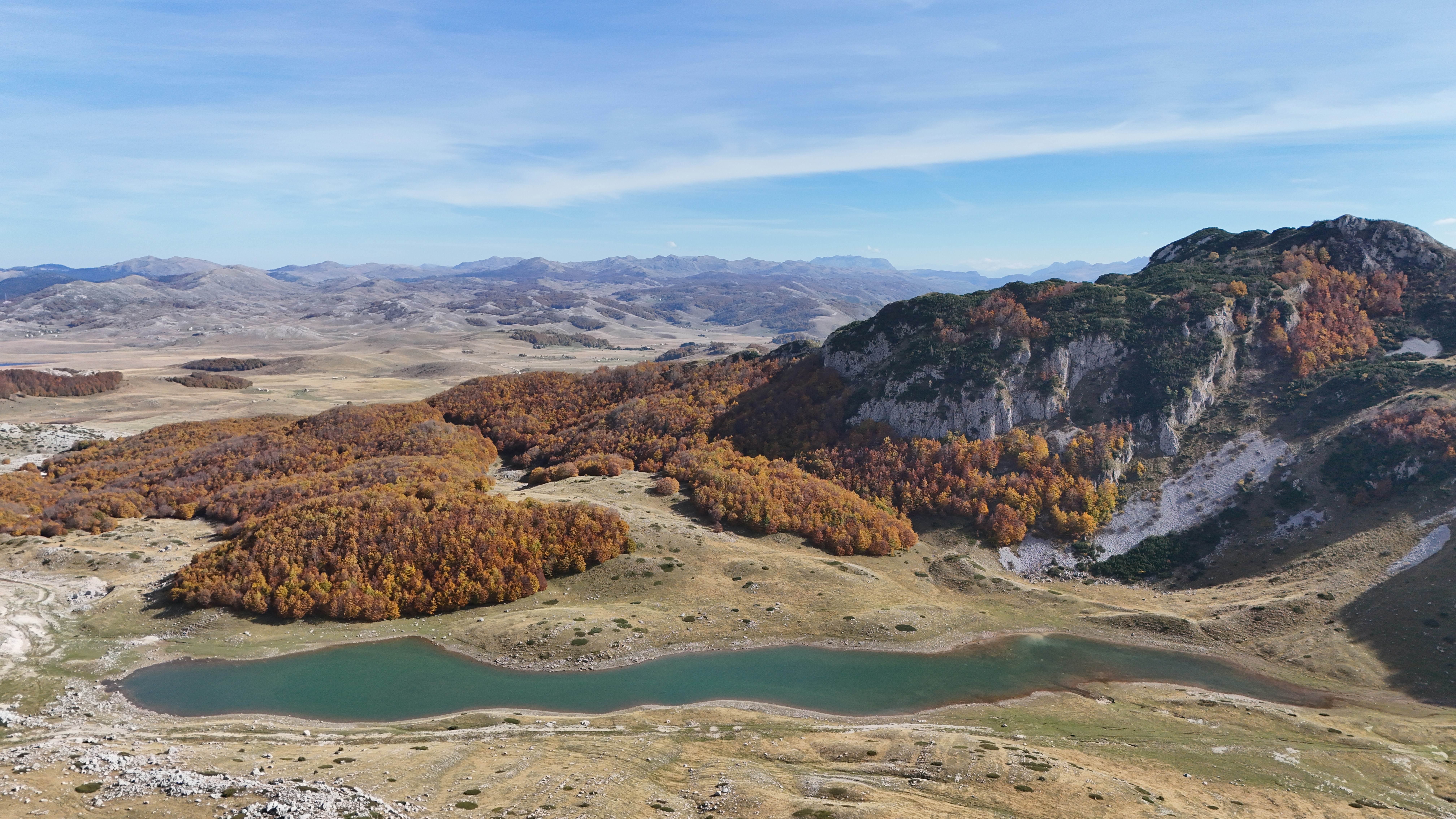 Autumn's Embrace Over Serene Waters