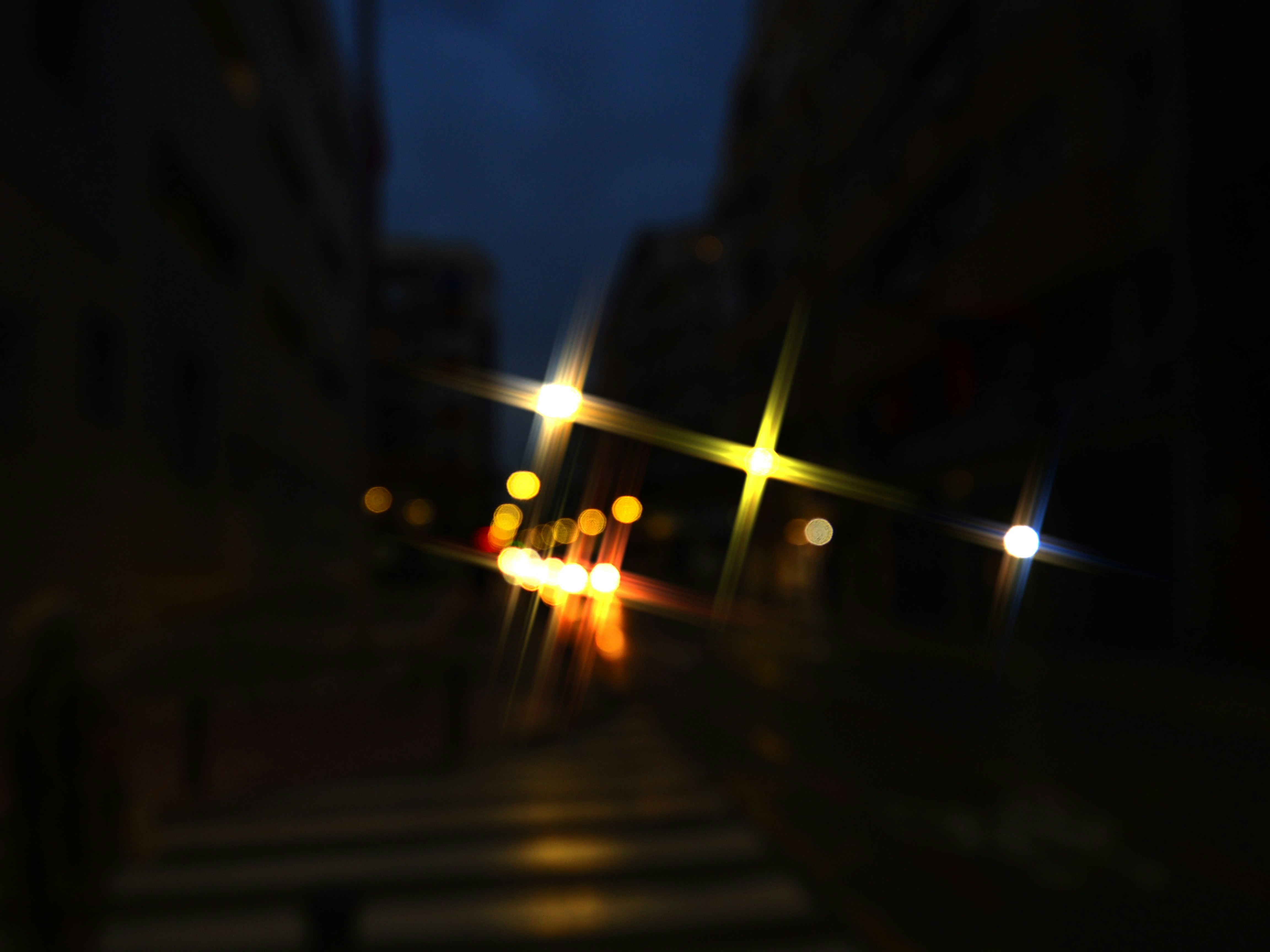 Bokeh lights after sunset, Alicante | Blurred streetlights at night with buildings