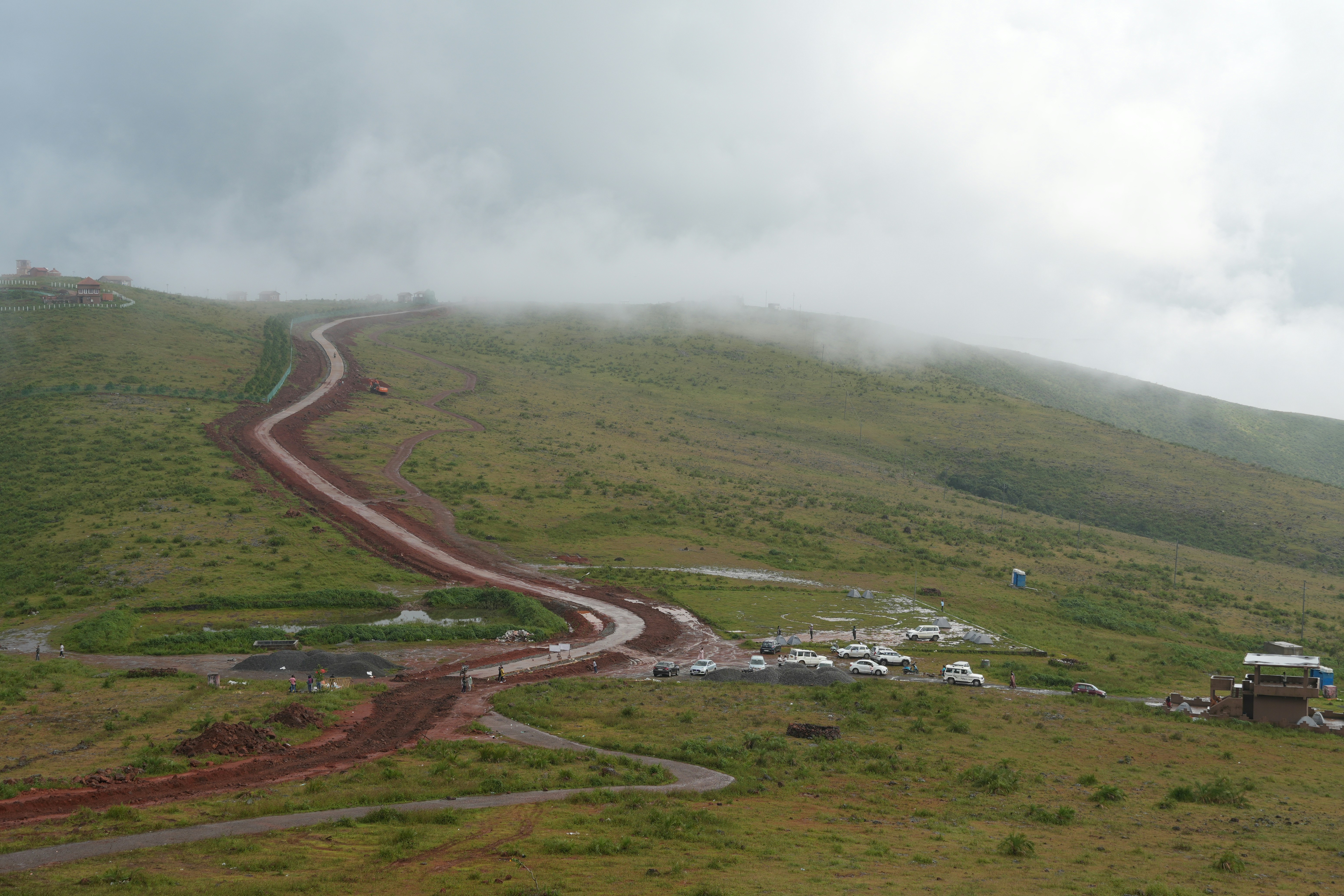 Winding Path Through Misty Hills