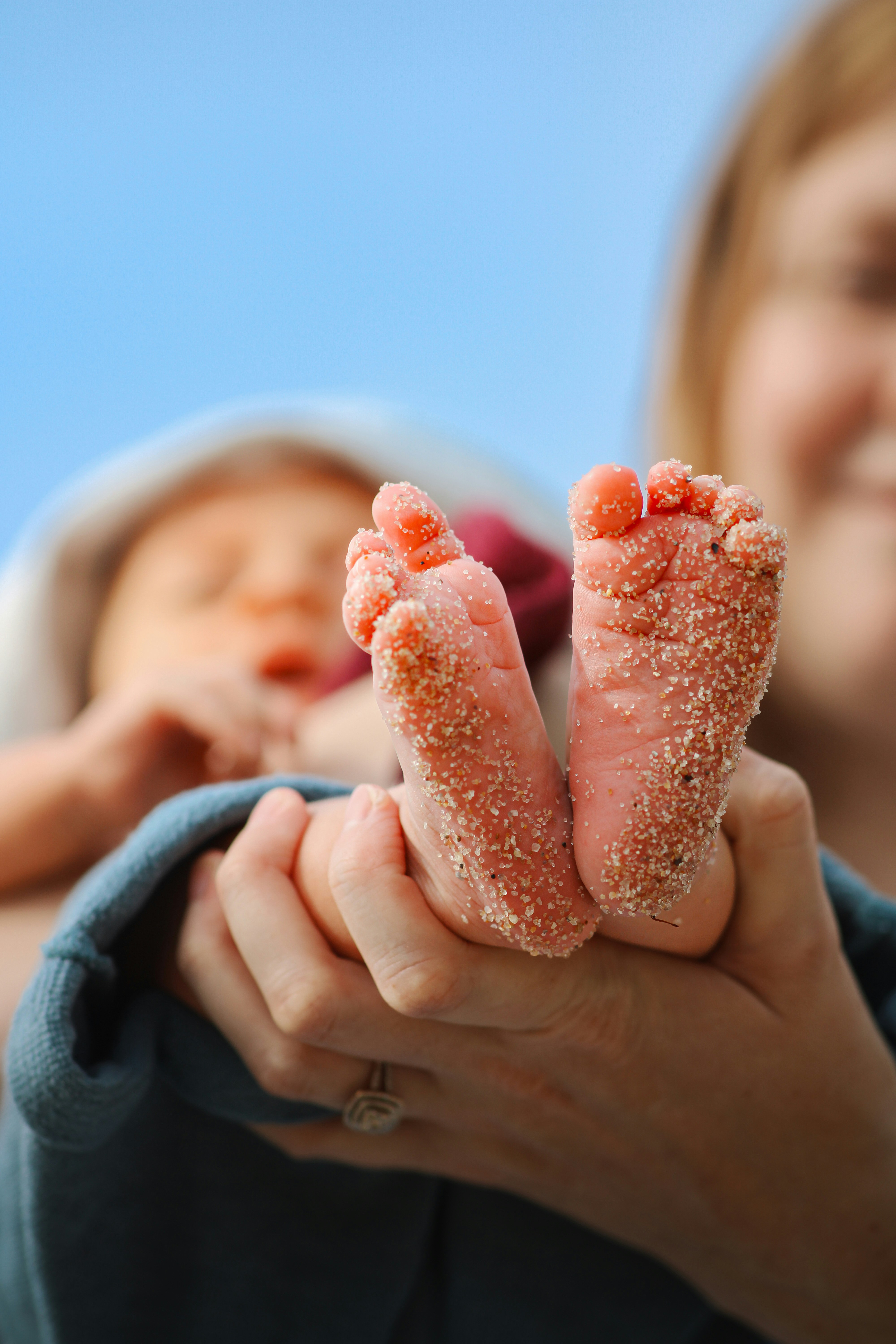 Tiny Toes in a Sandy Embrace