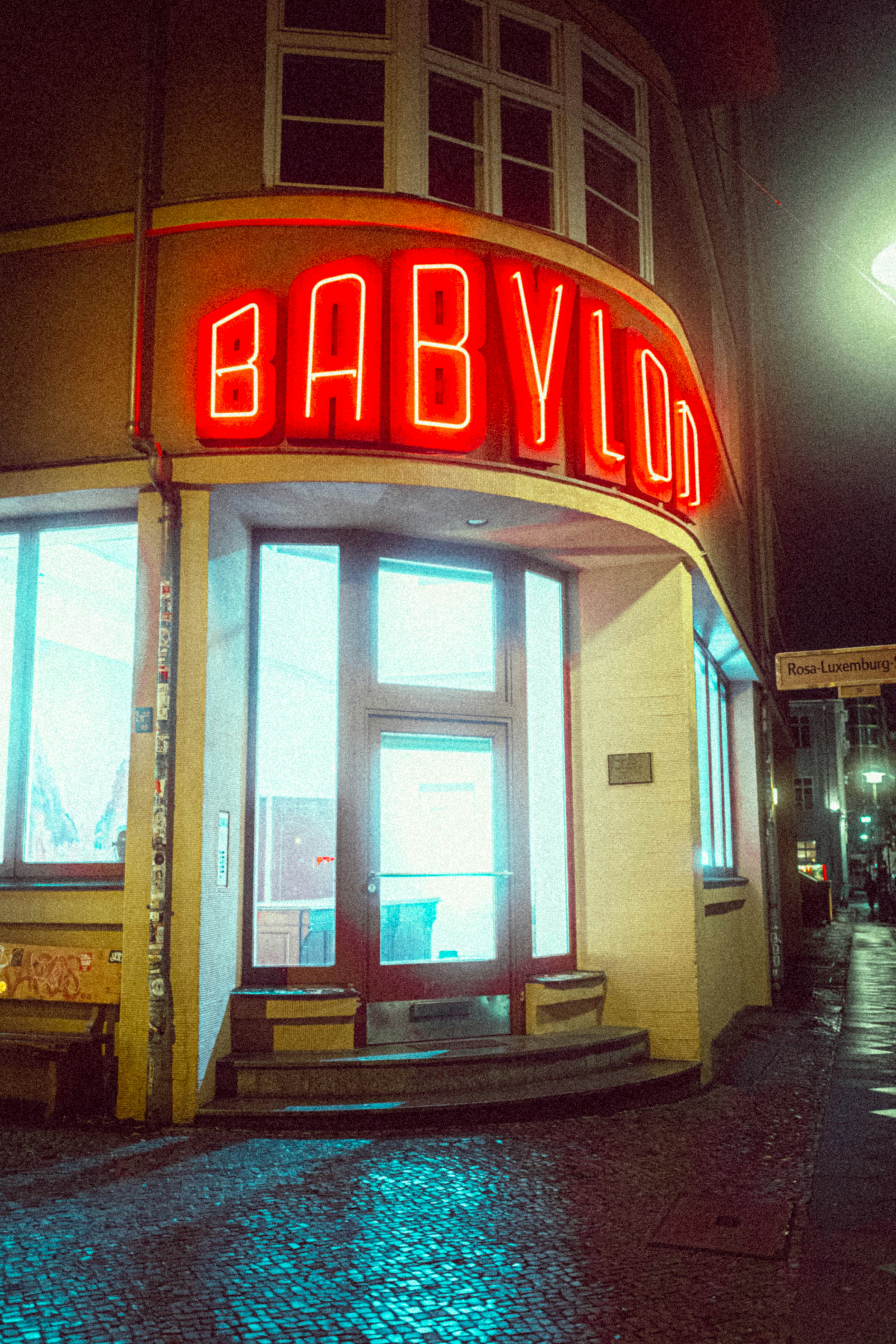 Neon Glow at the Corner: A Nighttime Invitation