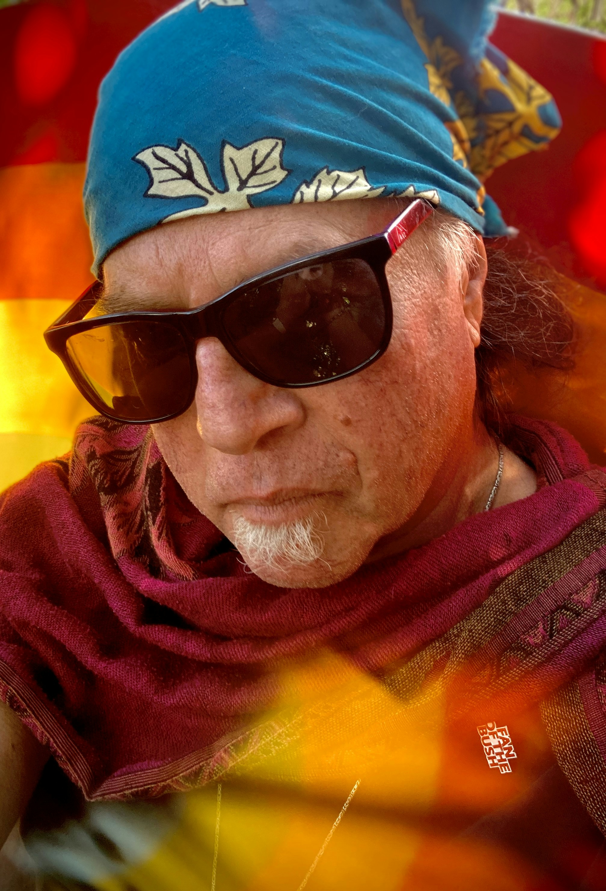 Man wearing sunglasses and a bandana