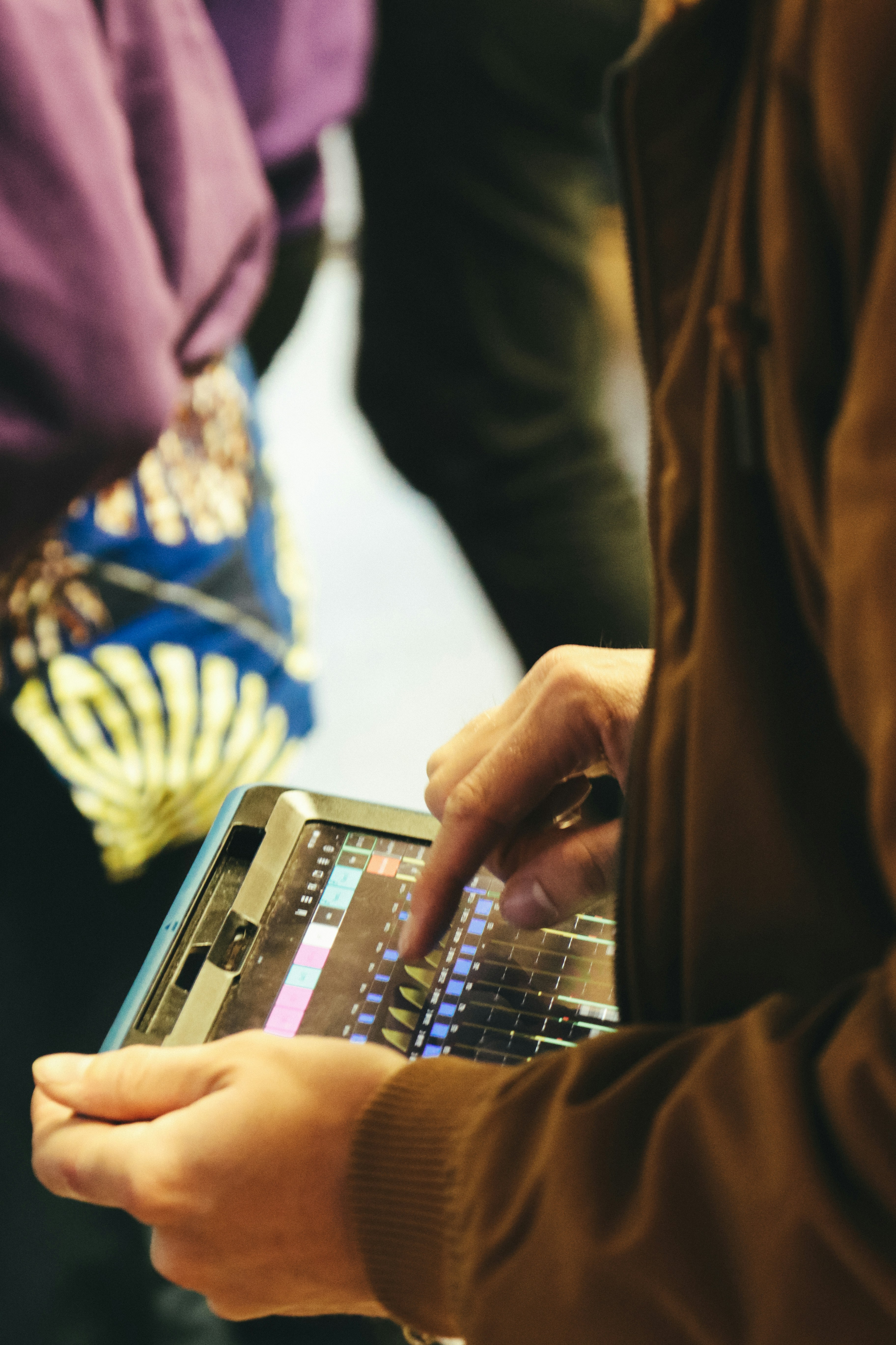 Fingers on Screen: Quick Color Grading in a Busy Street Scene