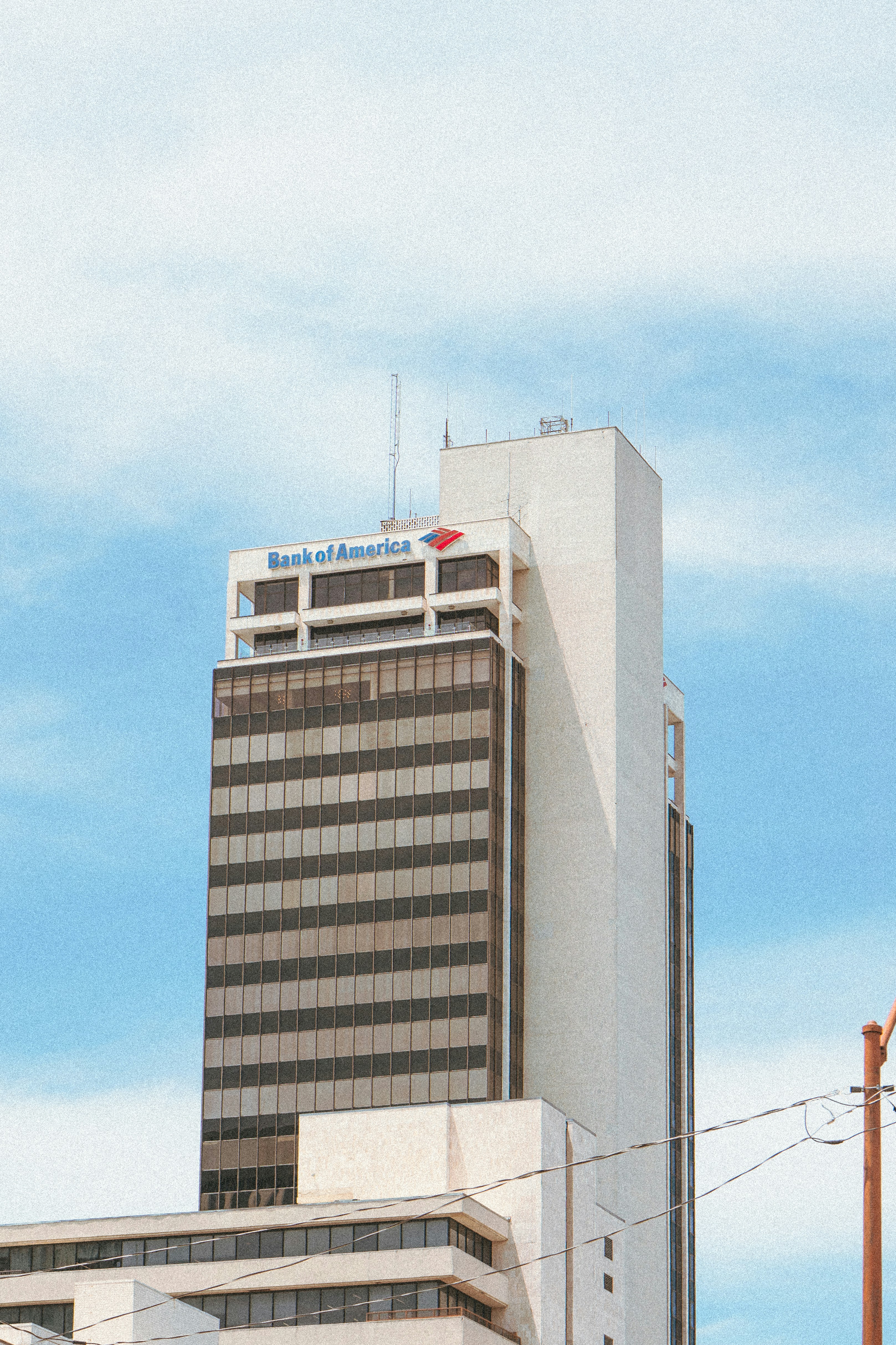 Bank of america building against a blue sky.