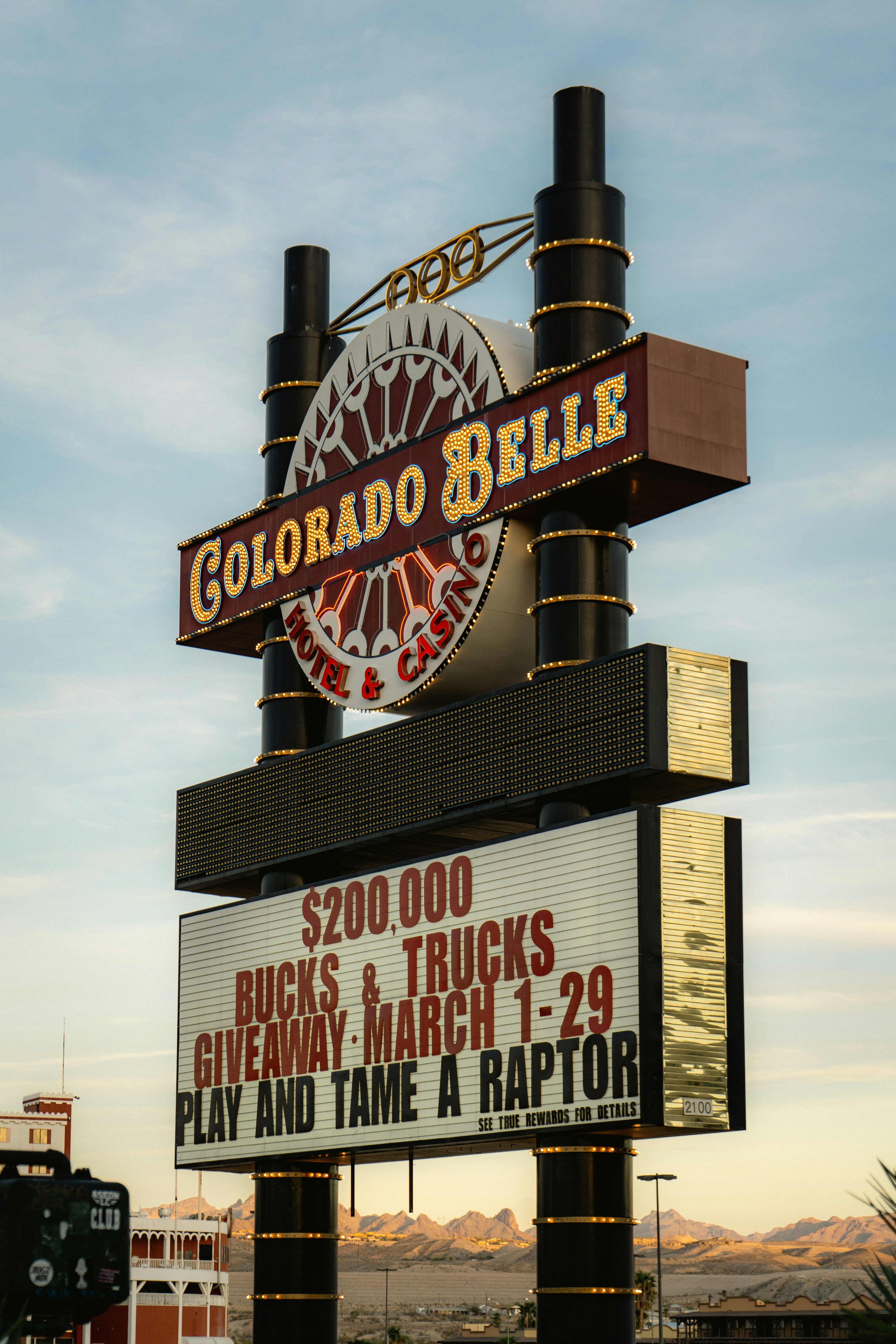 Neon Banner over Desert Skyline: The Colorado Belle Sign at Dusk