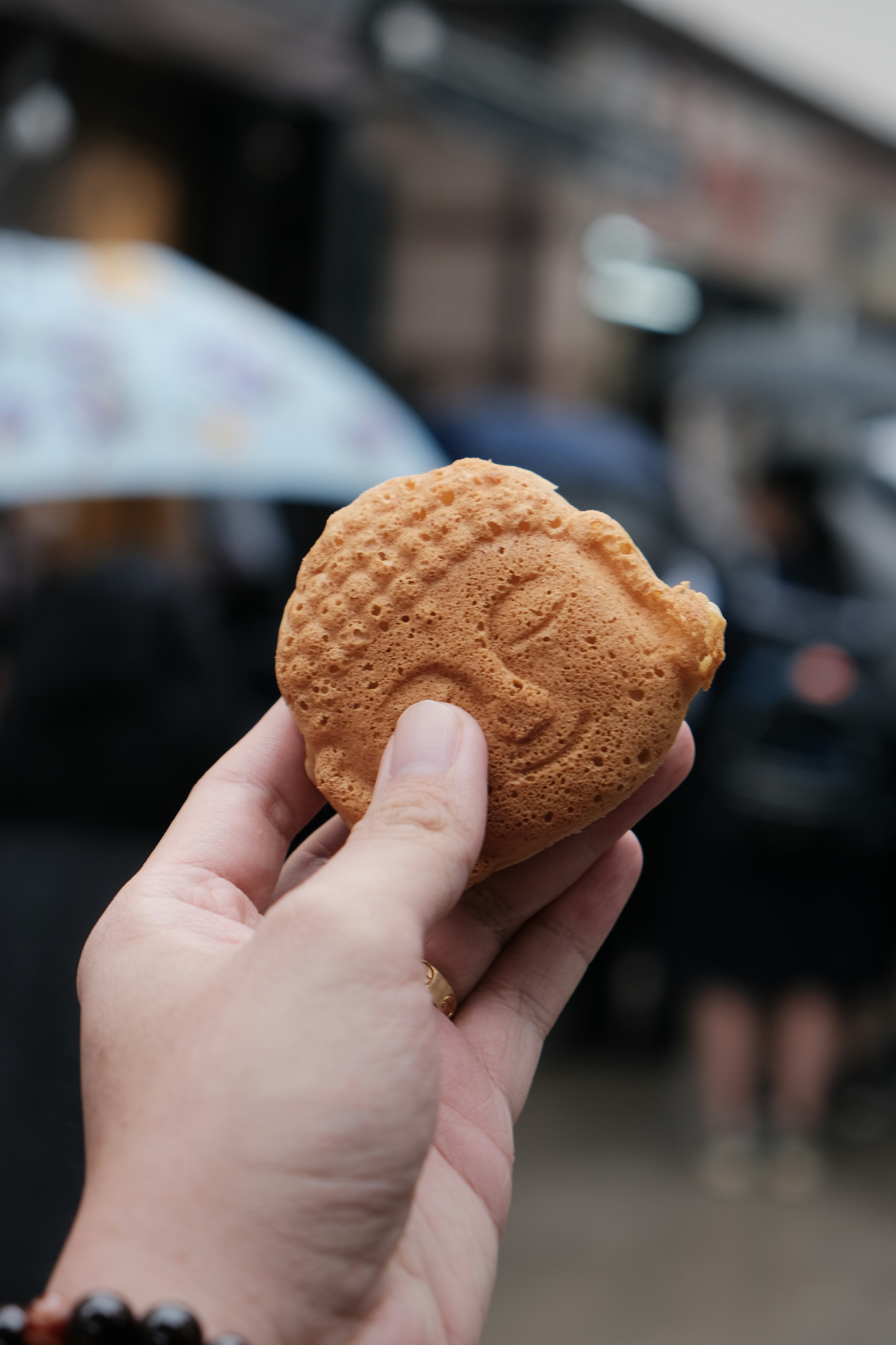 Center-Stage Cookie on a Rainy City Street