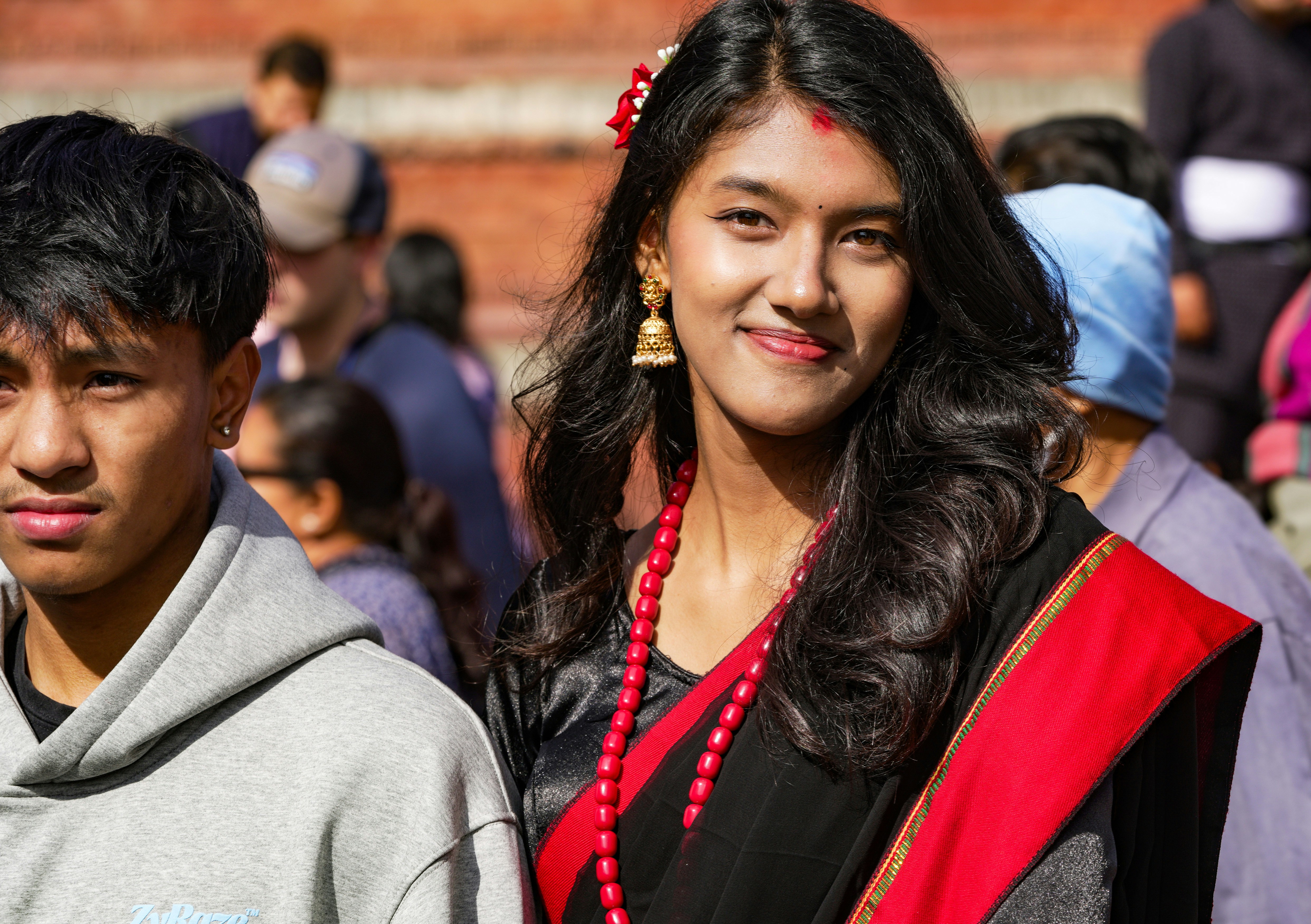 Young woman in traditional indian attire smiles