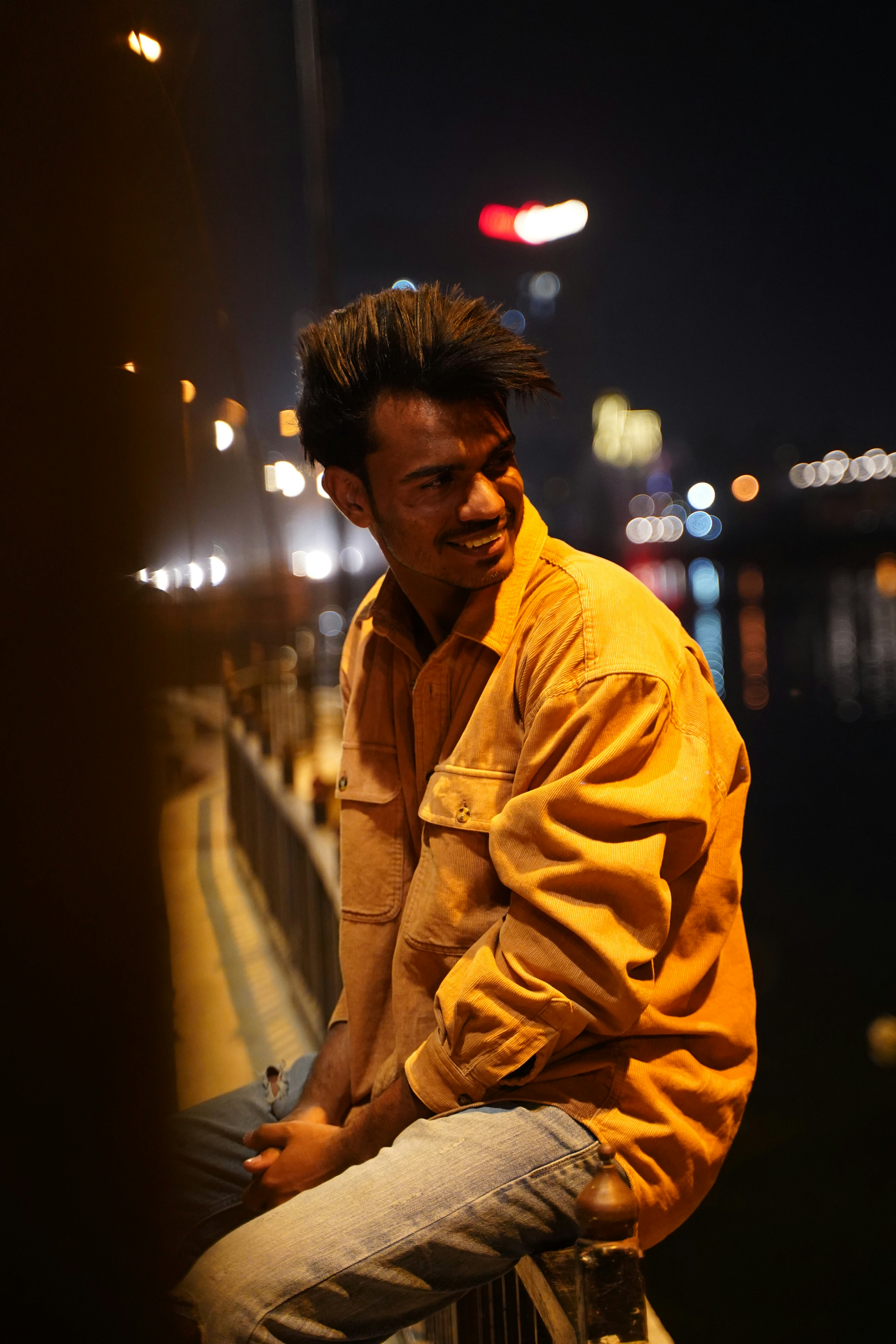 Neon Backdrop, Warm Encounters: A Night by the Pier