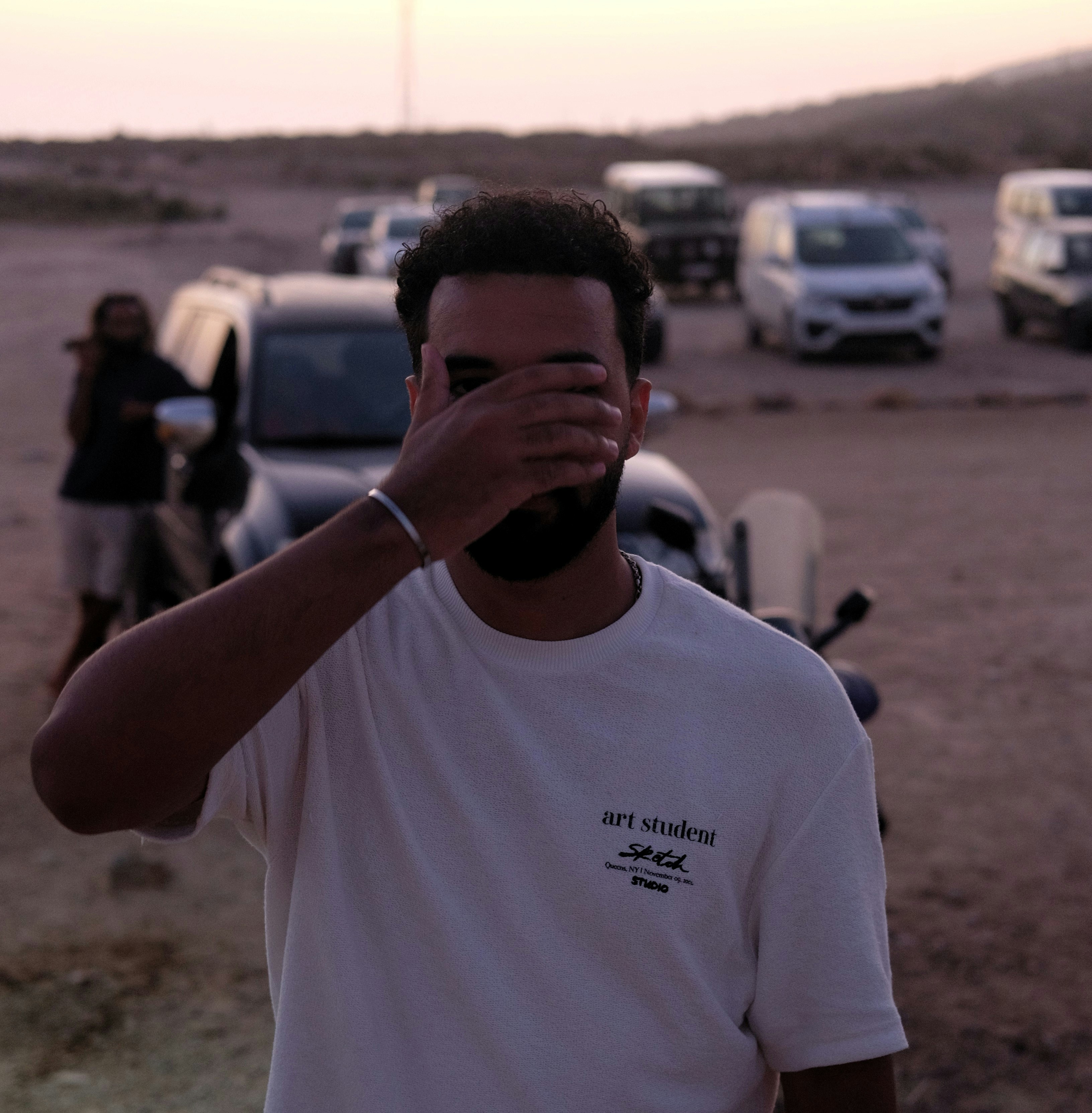 Desert Dusk: Hidden Expression Beneath a Sunset Veil