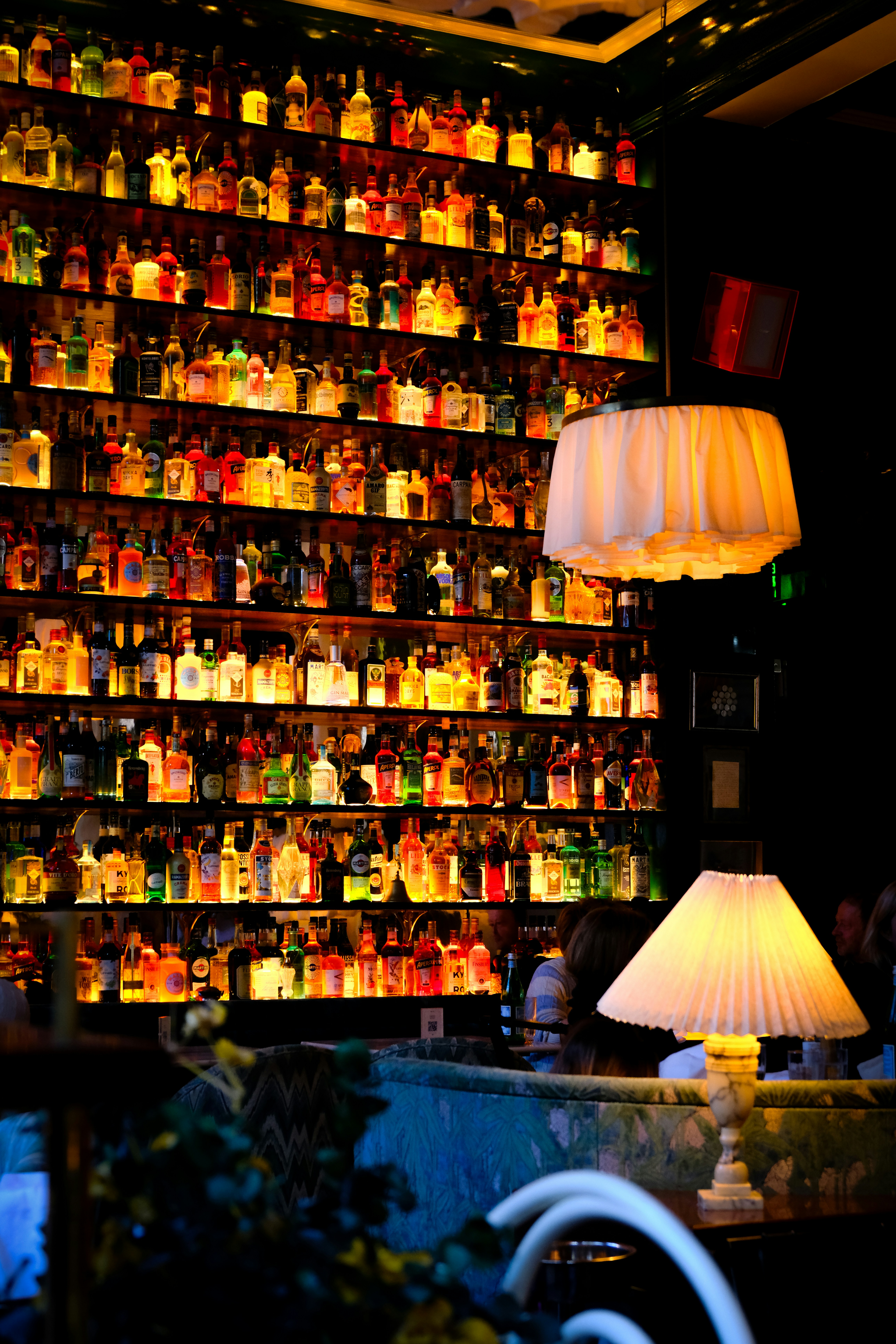 Illuminated Spirits: A Bar's Colorful Collection