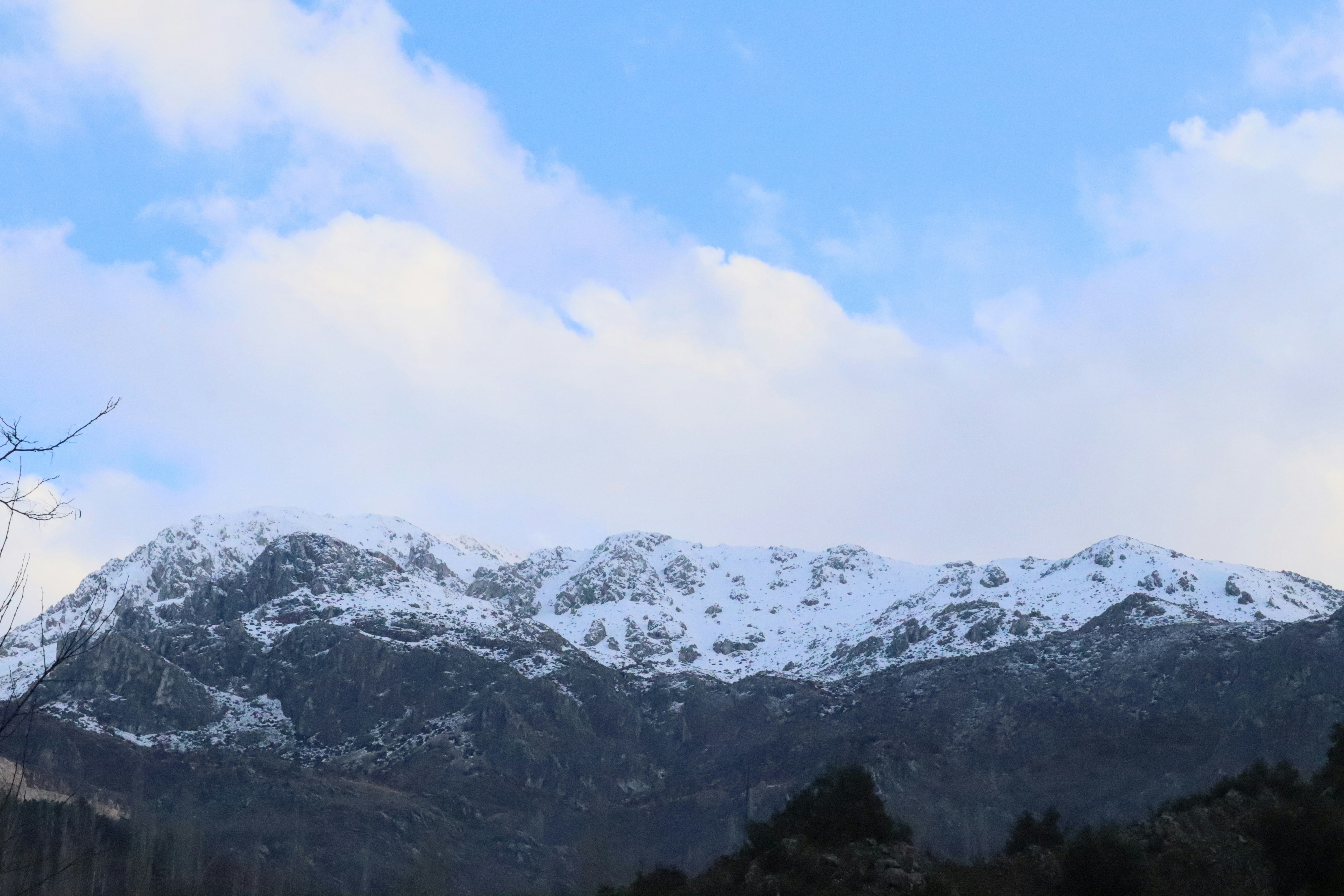 Whispers of Winter: The Silent Majesty of Snow-Capped Peaks
