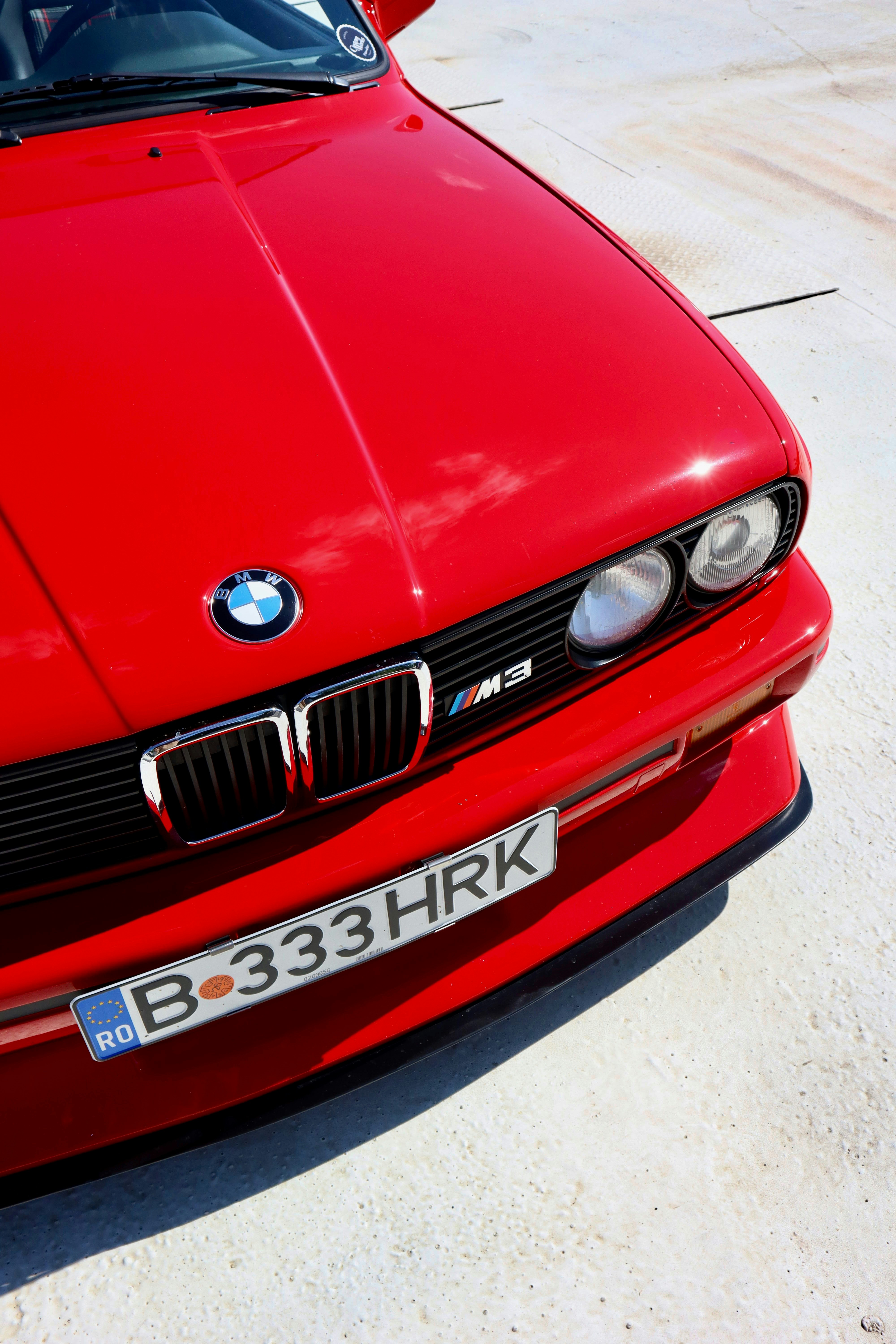 Bmw e30 | Close up of a red BMW m3
