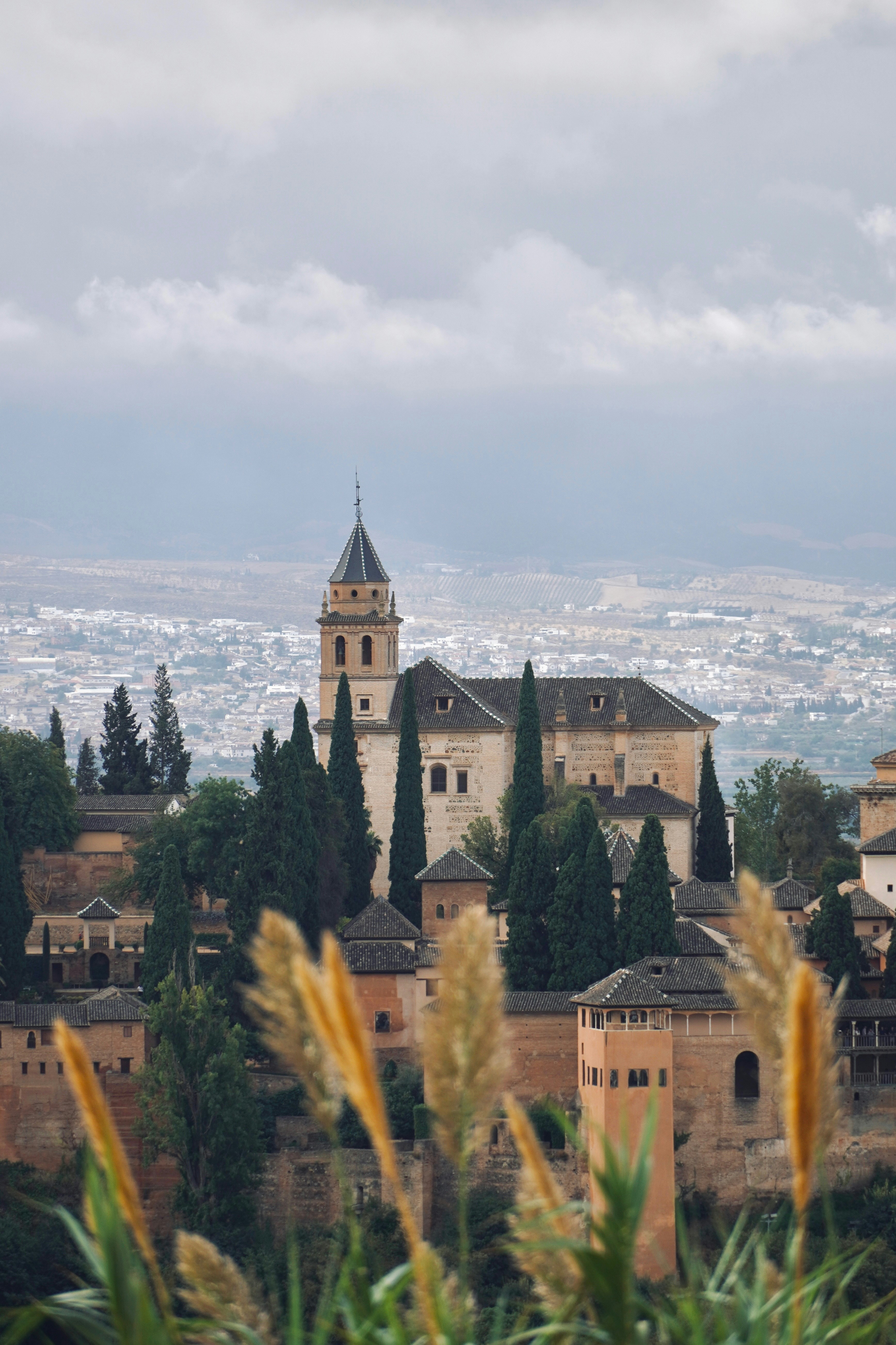 Historic alhambra palace complex with city in background