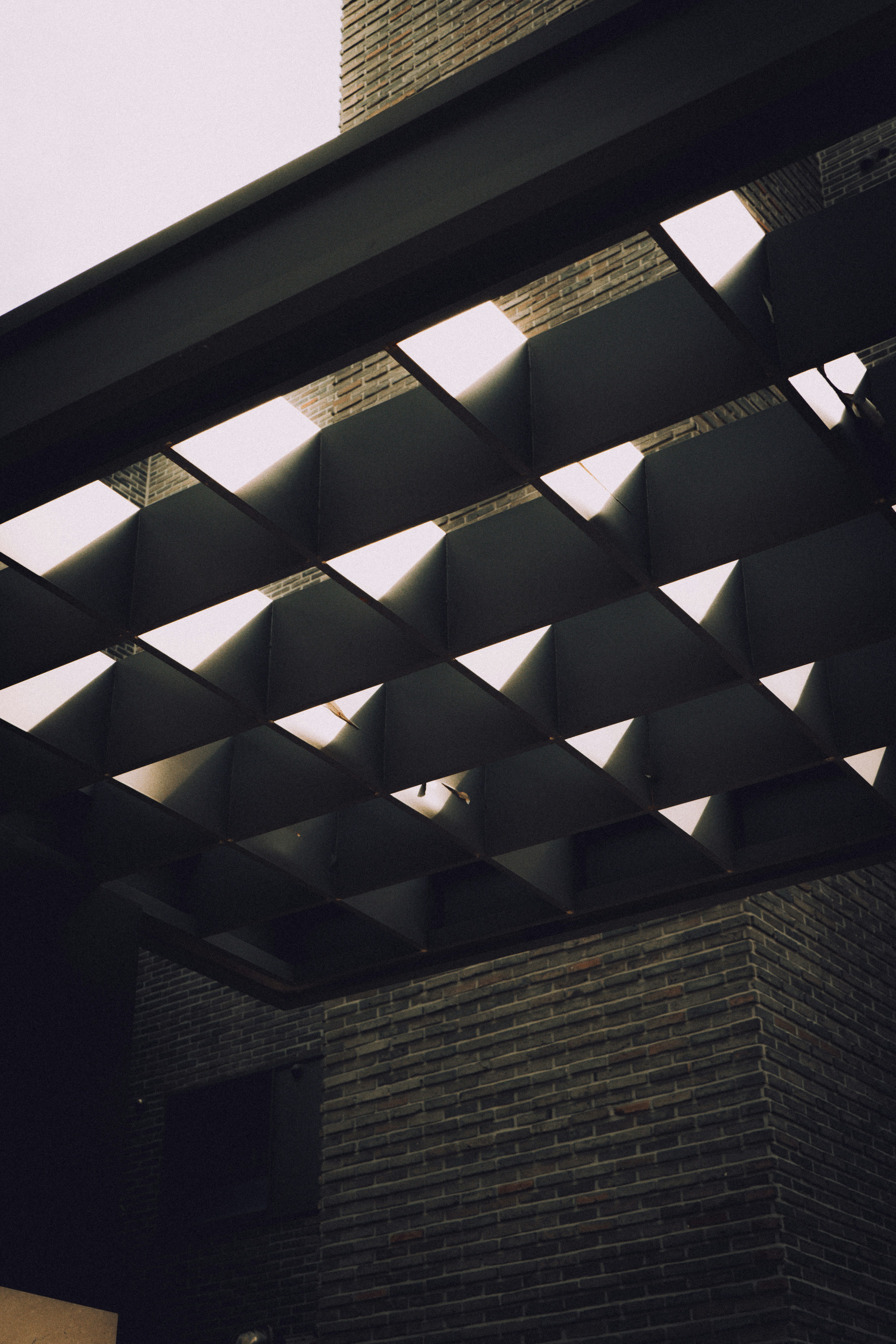 Geometric pattern of dark beams and white light photo – Free Brick wall ...