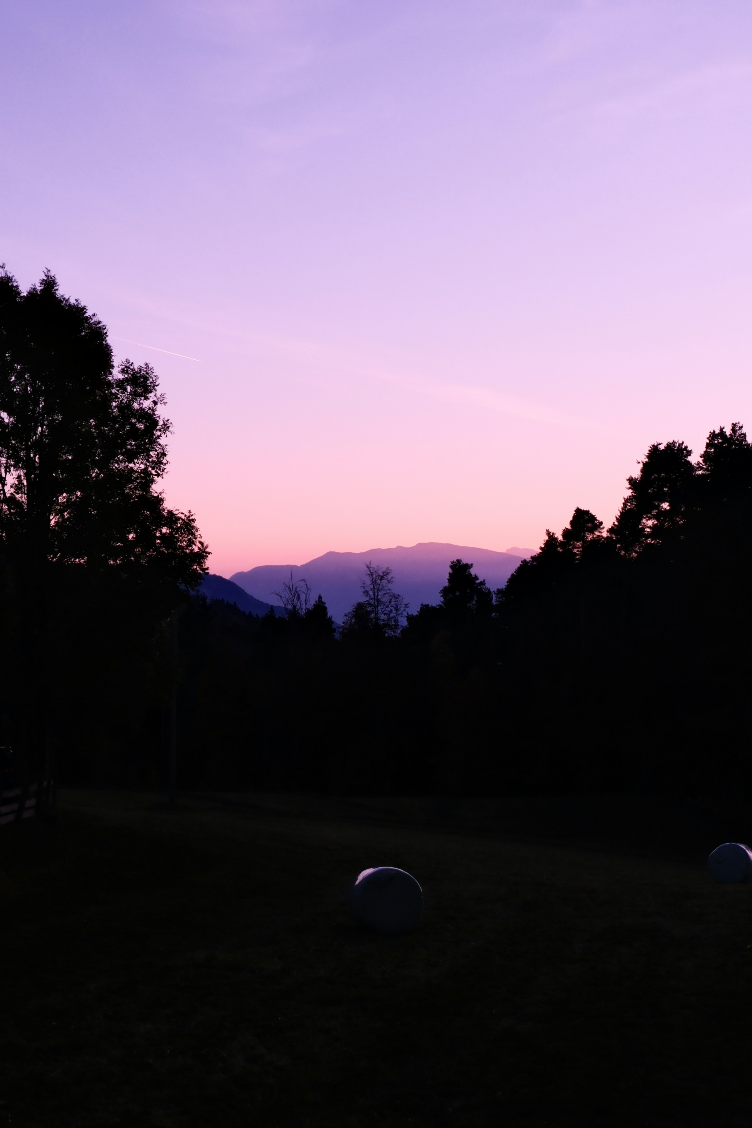 Twilight's Embrace Over the Mountains
